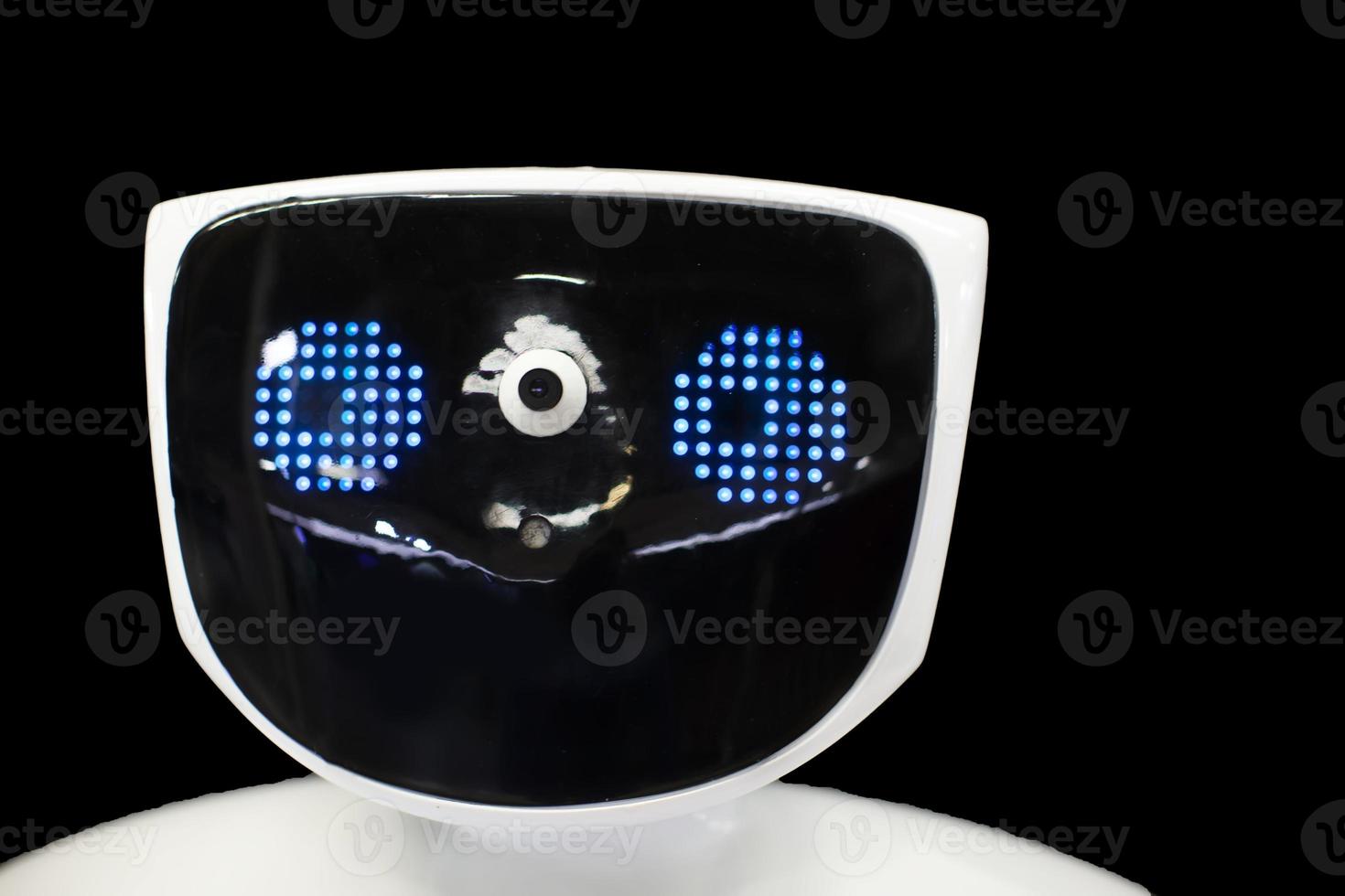 Robot face with electronic eyes on a black background. 18907043 Stock ...