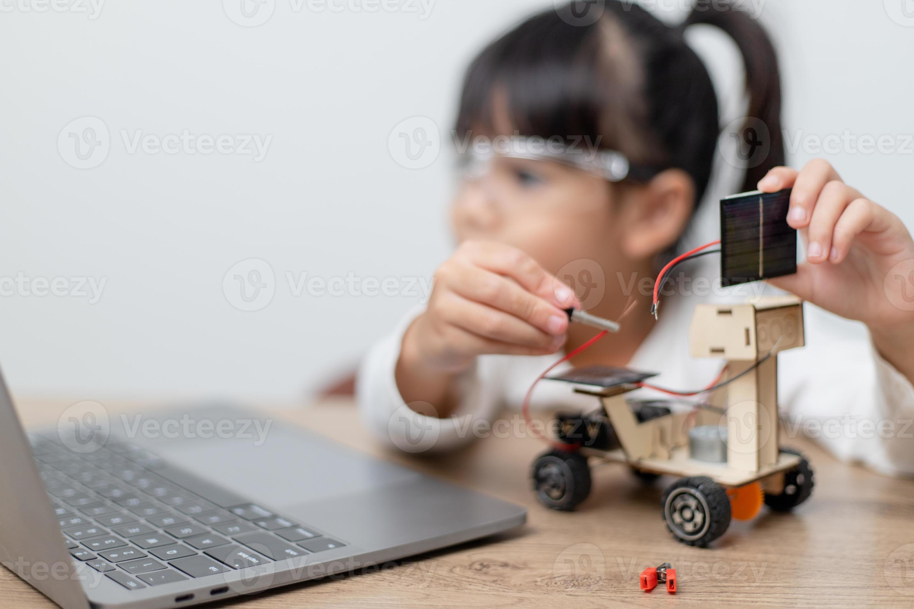 Asia students learn at home in coding robot cars and electronic board ...