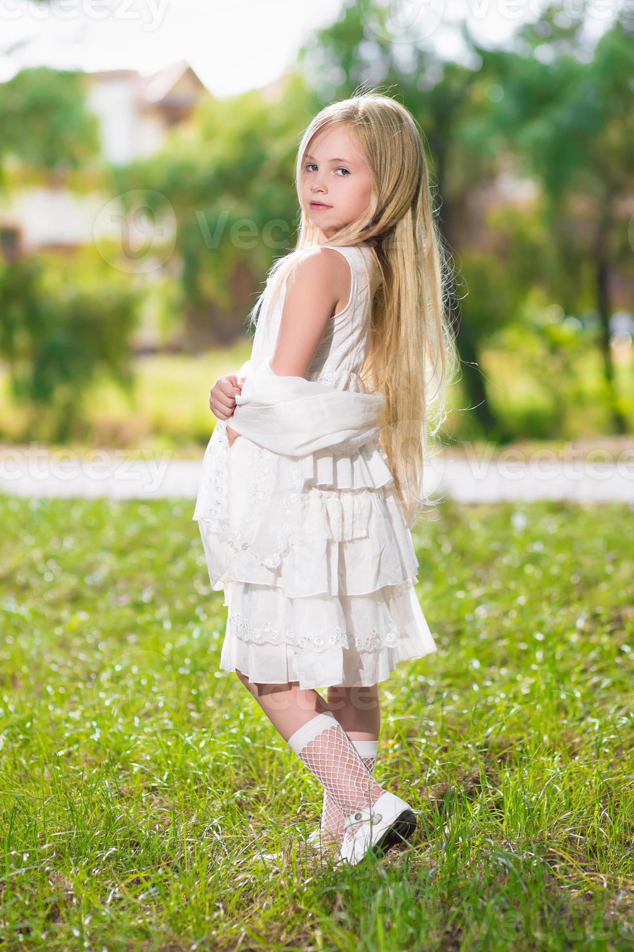 Little blond girl 18950540 Stock Photo at Vecteezy