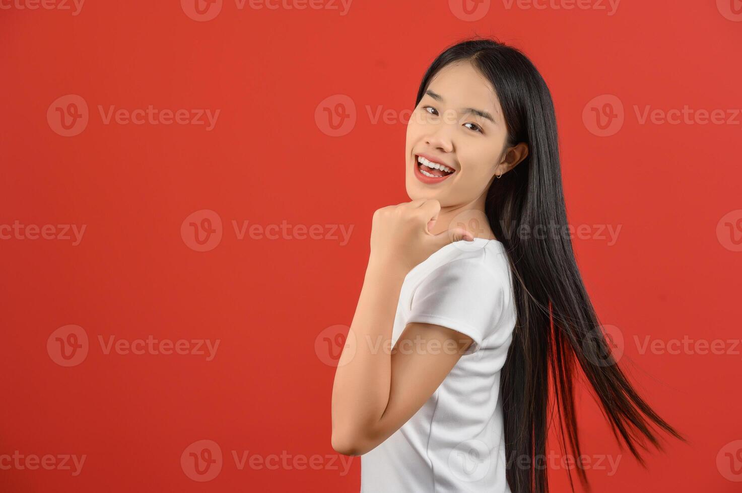 Portrait Of Happy Young Asian Woman In White T Shirt Showing Thumb Up