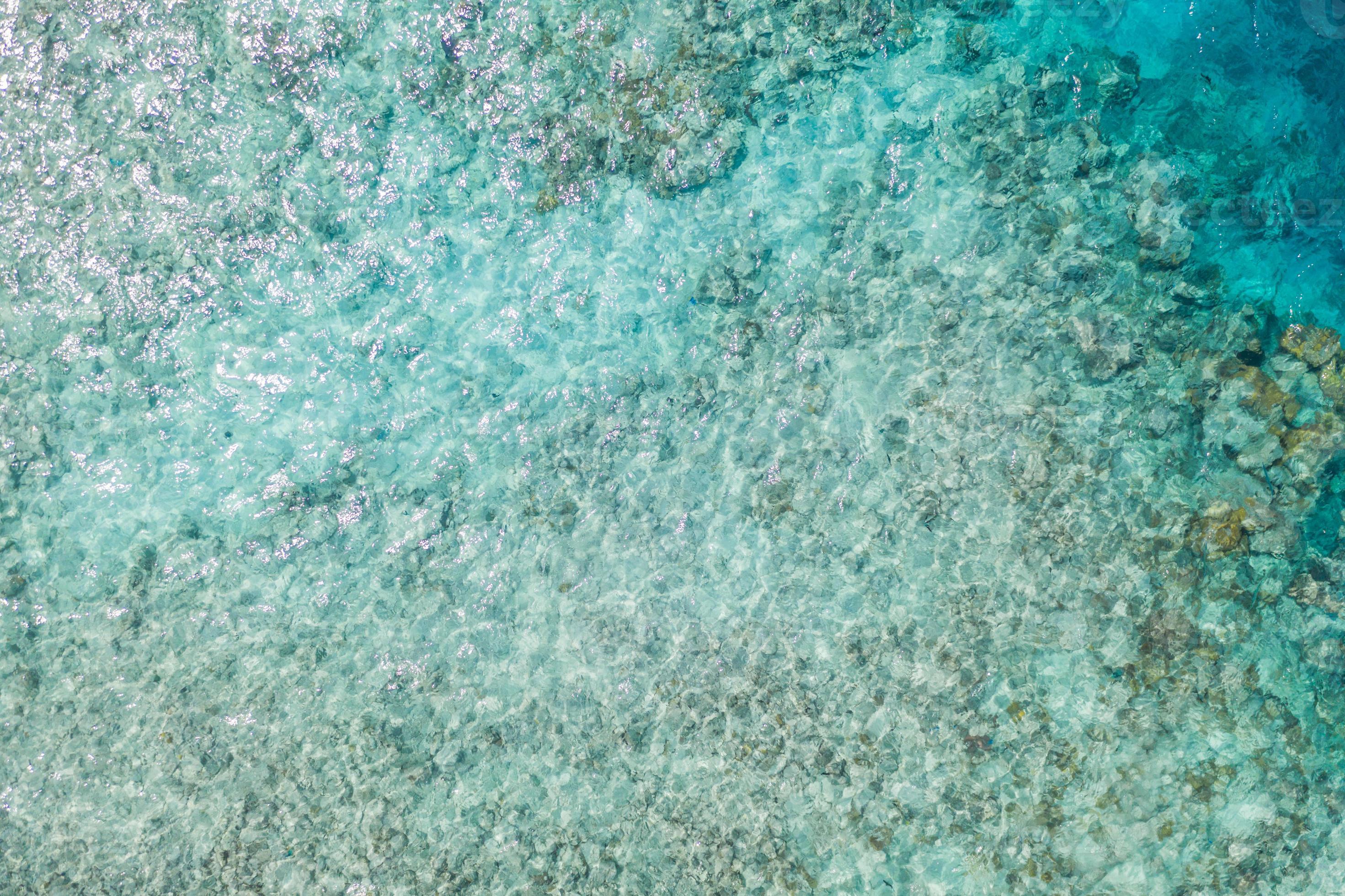 Beautiful coral reef in Maldives island, aerial landscape, shallow sea water as lagoon. Amazing ...