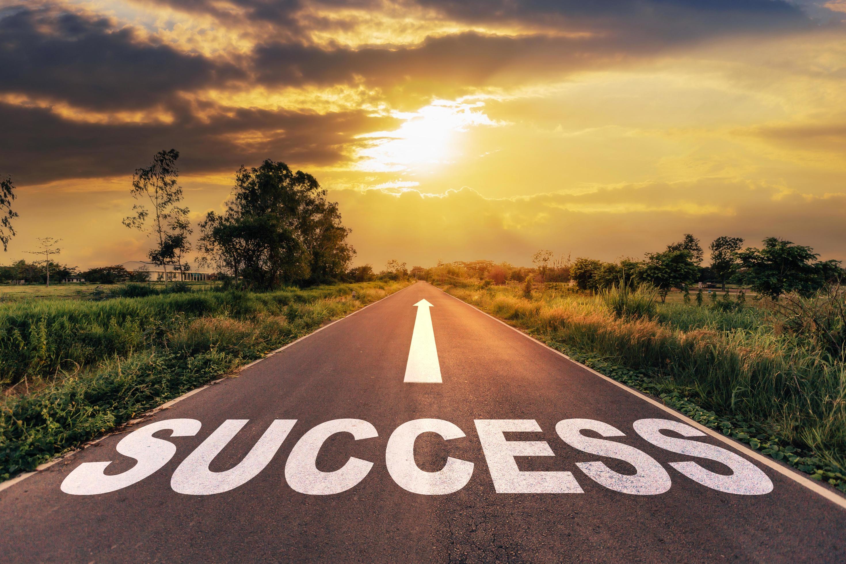 Success text on the highway road concept for planning and challenge or ... Success text on the highway road concept for planning and challenge or ...