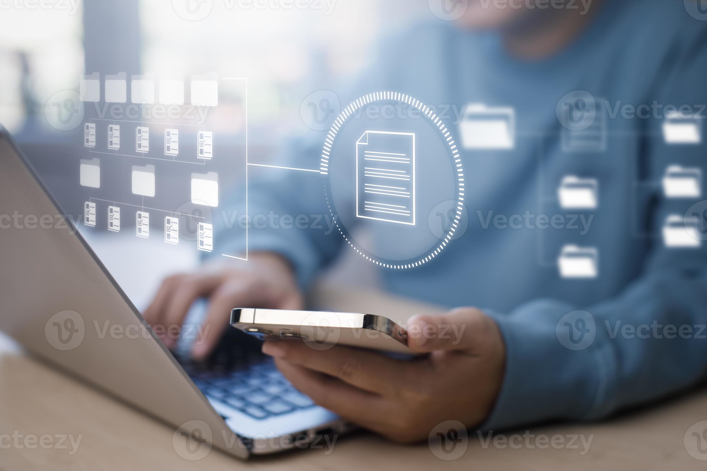 Businesswoman working on laptop with virtual screen. Online documentation database, IT ...
