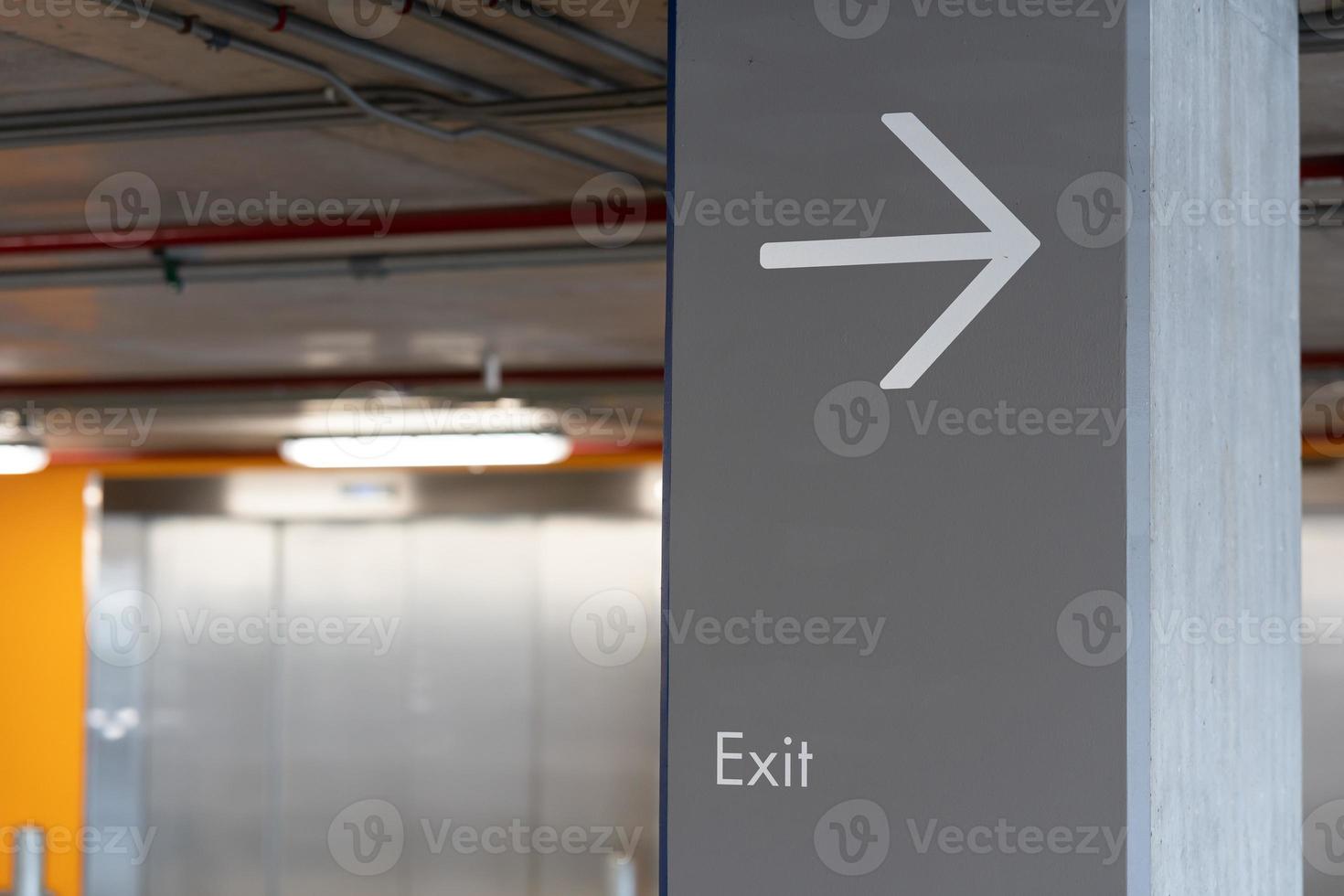 Arrow pointing to the exit on the pole. Exit Sign, Metal Exit Sign ... Arrow pointing to the exit on the pole. Exit Sign, Metal Exit Sign ...