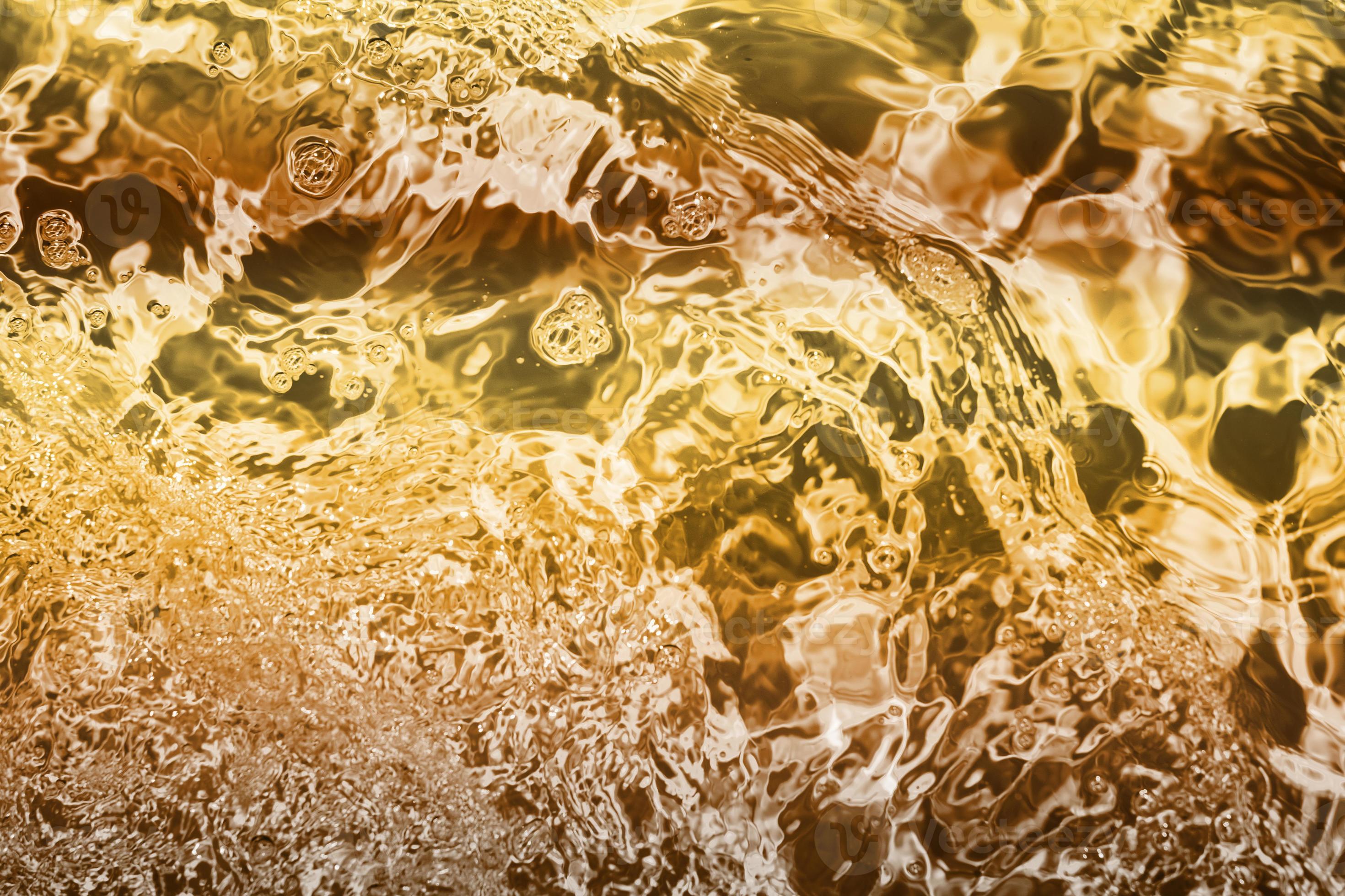 Blurred transparent Yellow Gold colour clear calm water surface texture ...