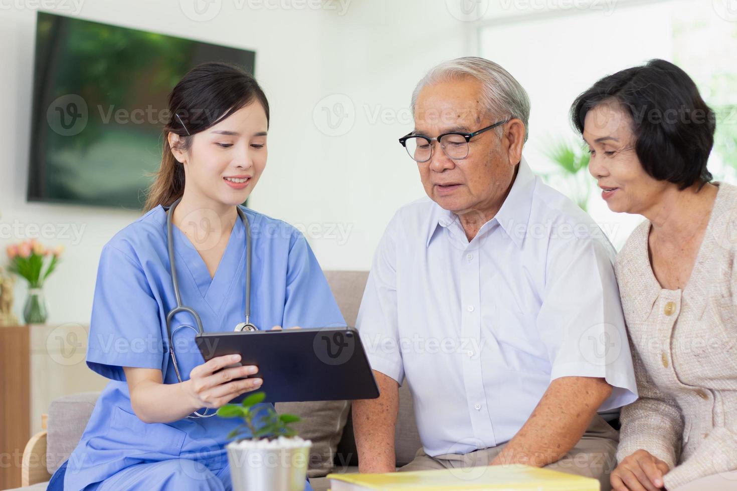 Nursing Home Care concept. The staff explained to the elderly who signed a medical treatment ...