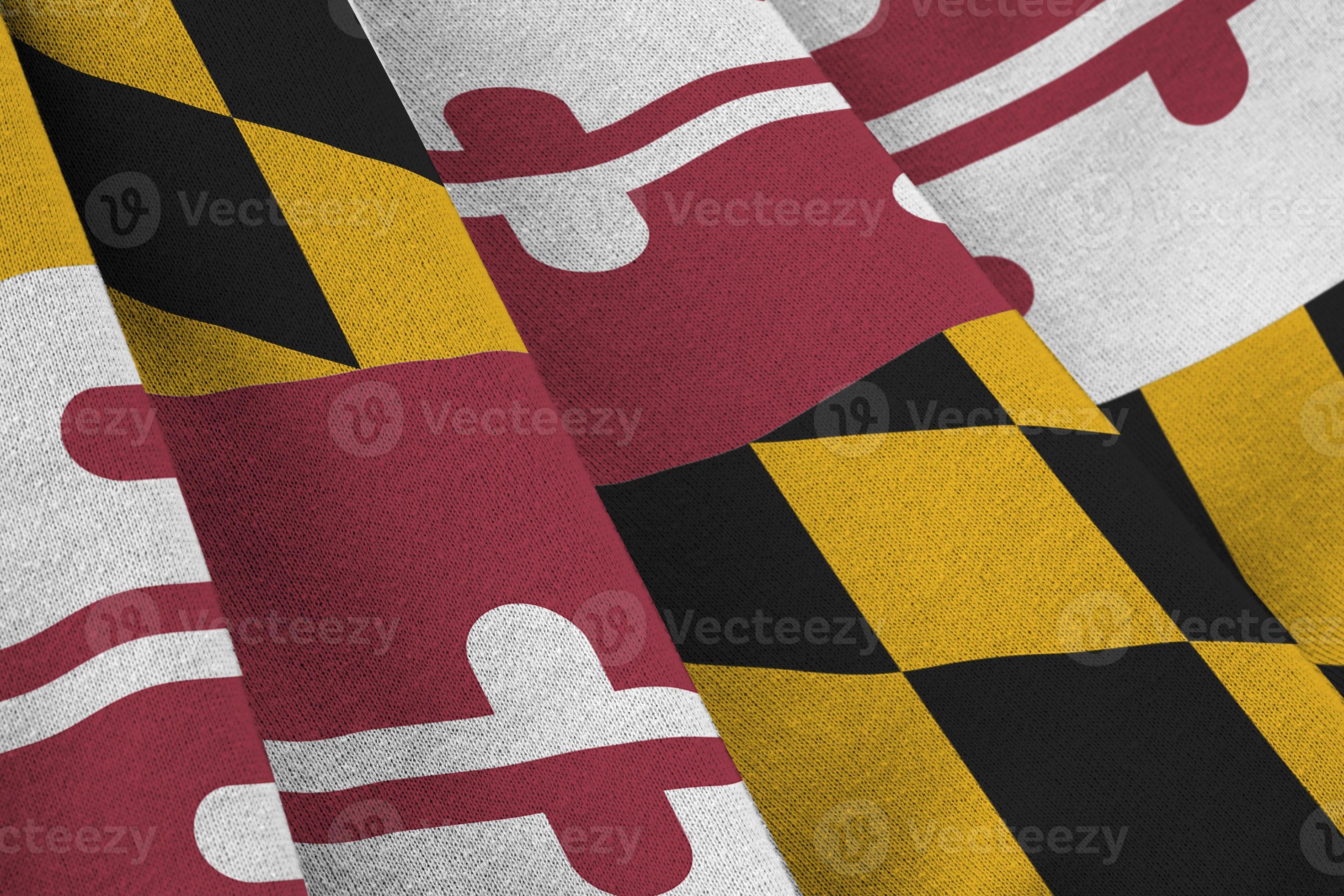Maryland US state flag with big folds waving close up under the studio light indoors. The ...