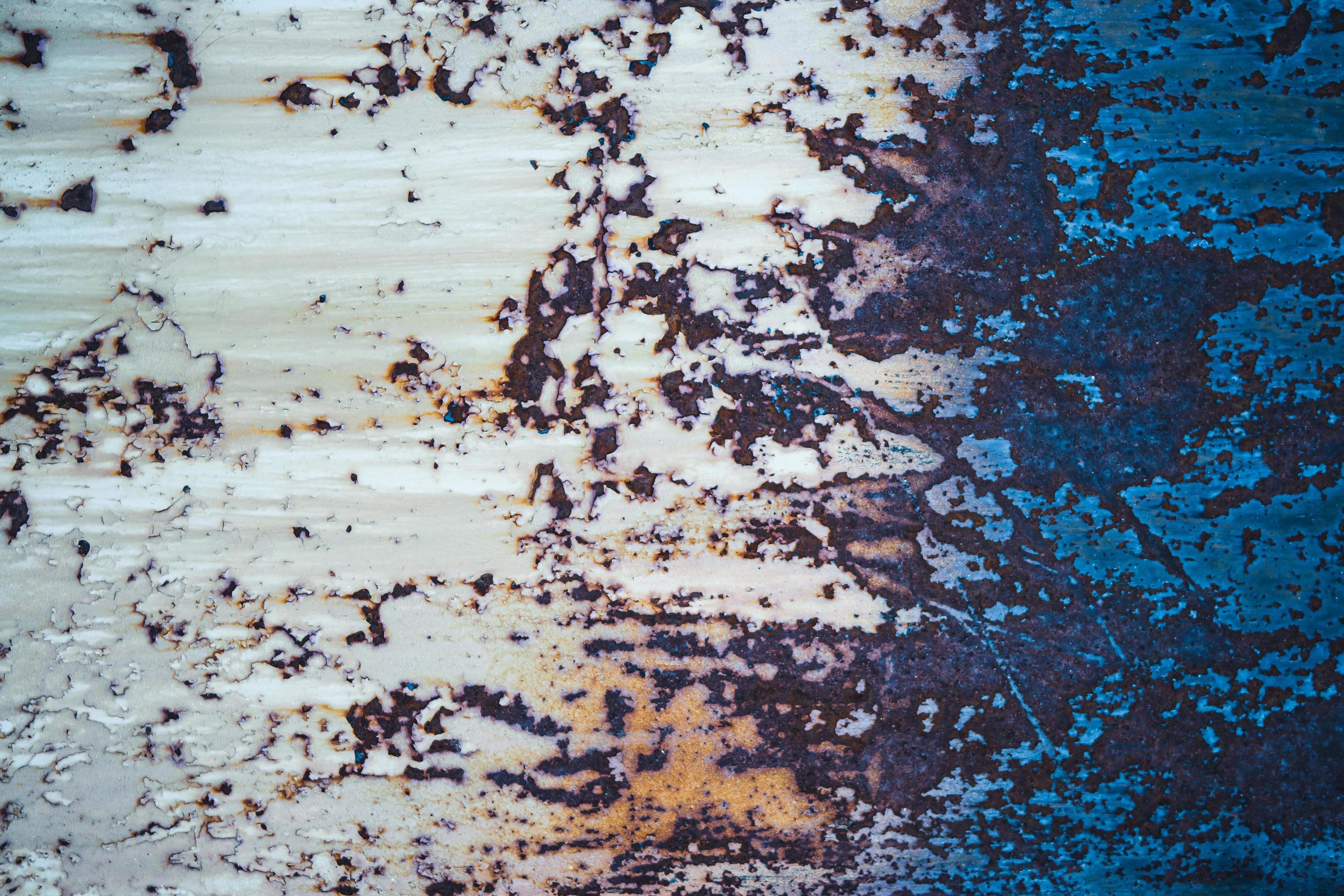 Burnt darkened sheet of painted rusty metal background. 20204944 Stock Photo at Vecteezy