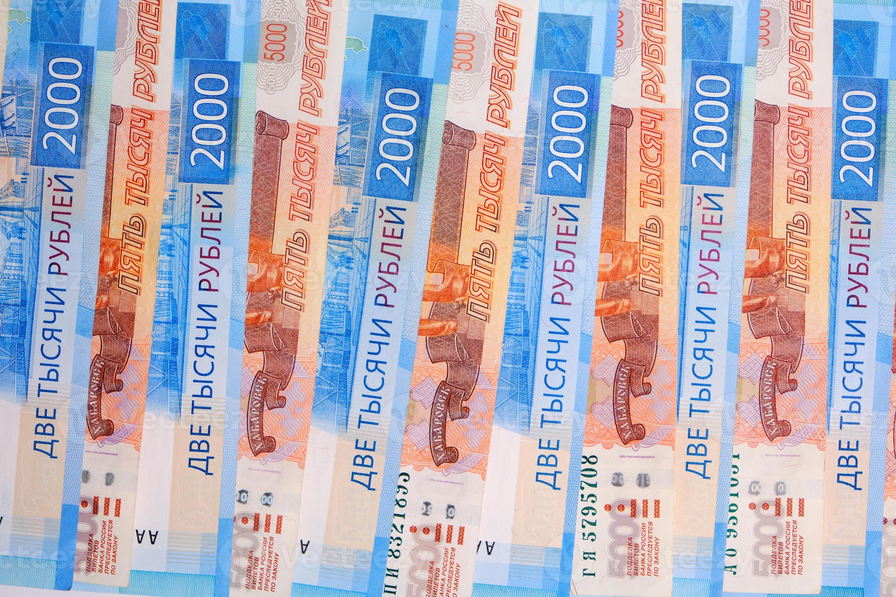 Background Russian Rubles Banknotes In Denominations Of Two And Five background-russian-rubles-banknotes-in-denominations-of-two-and-five