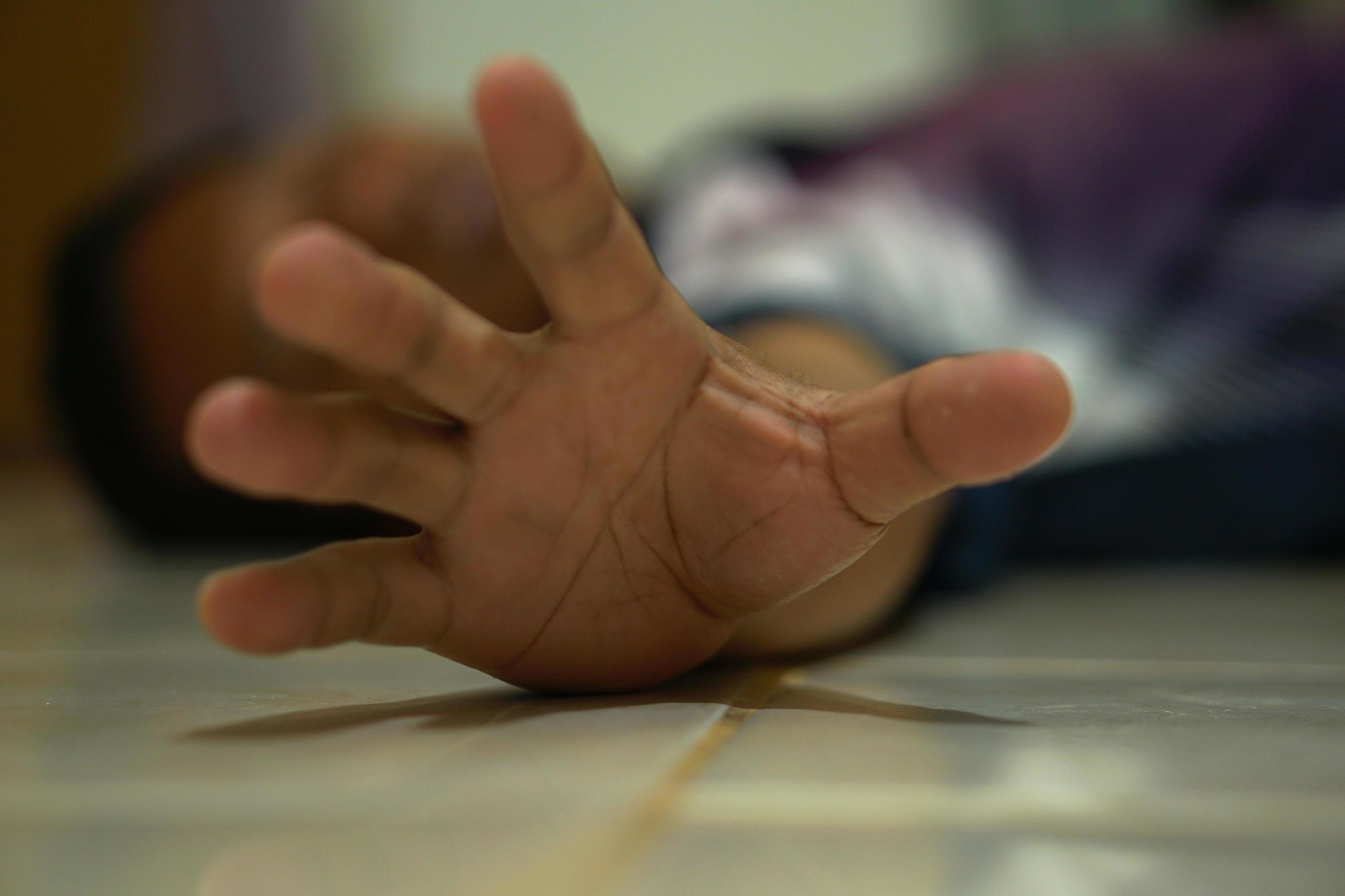 Male hands asking for help after falling 20463443 Stock Photo at Vecteezy