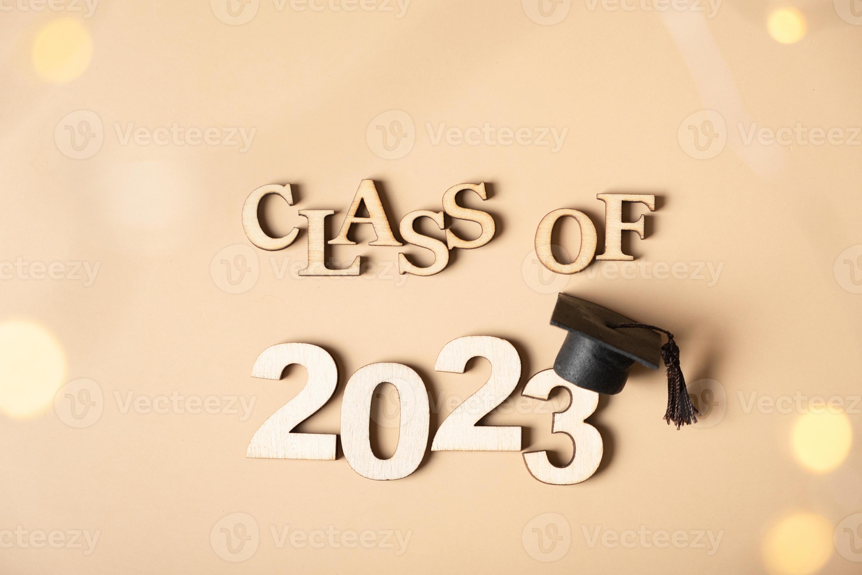 Class of 2023 concept. Wooden number 2023 with graduated cap on beige ...