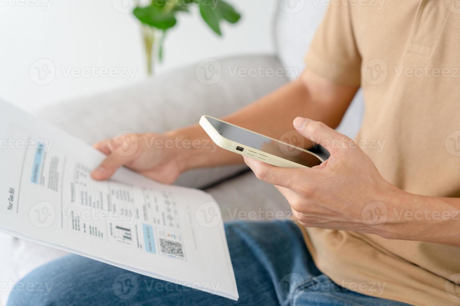 business man use phone to scan barcode or QR codes to pay credit card ... business man use phone to scan barcode or QR codes to pay credit card ...