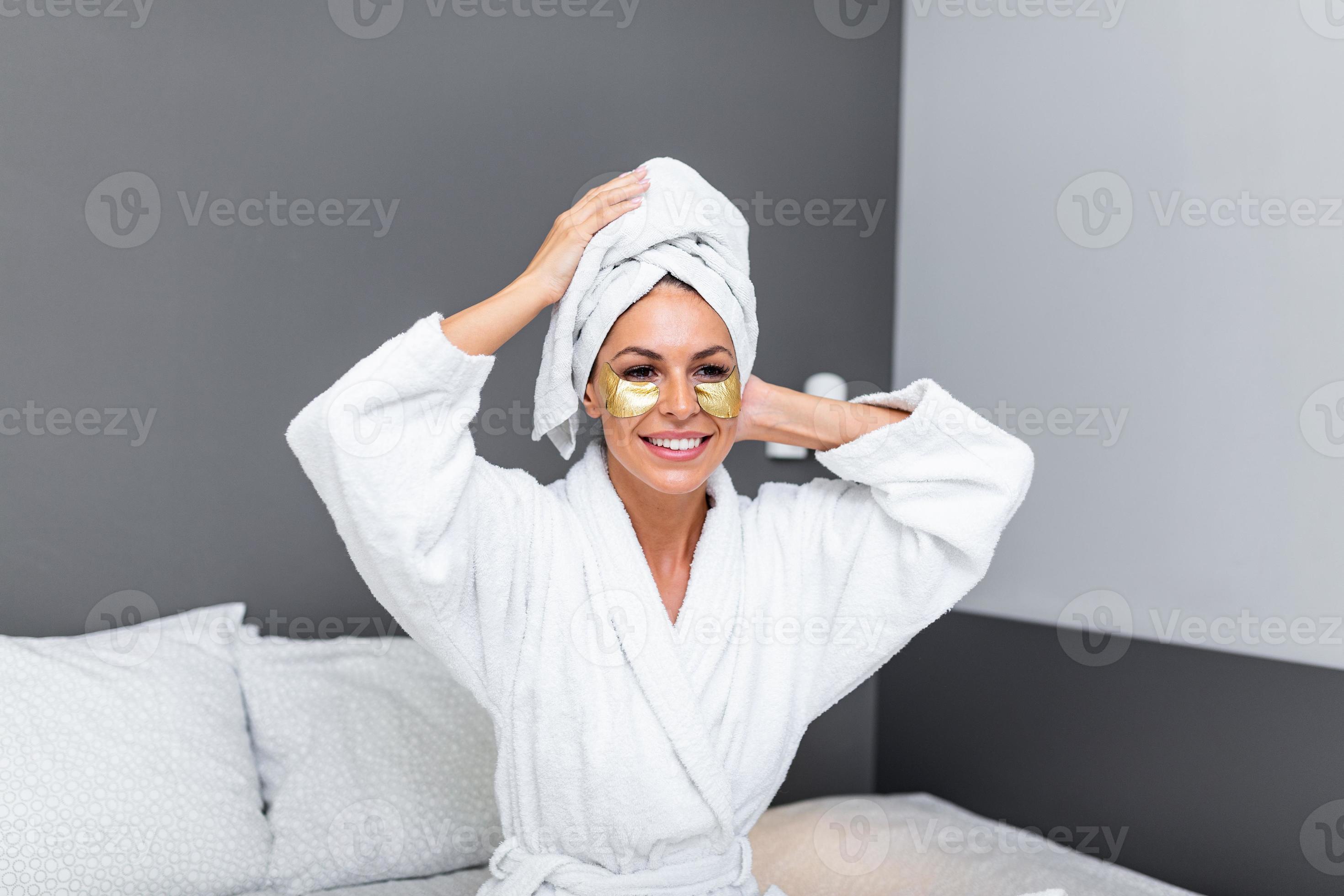 Beautiful Young Woman With Gold Cosmetics Mask Eye Patches Sitting On