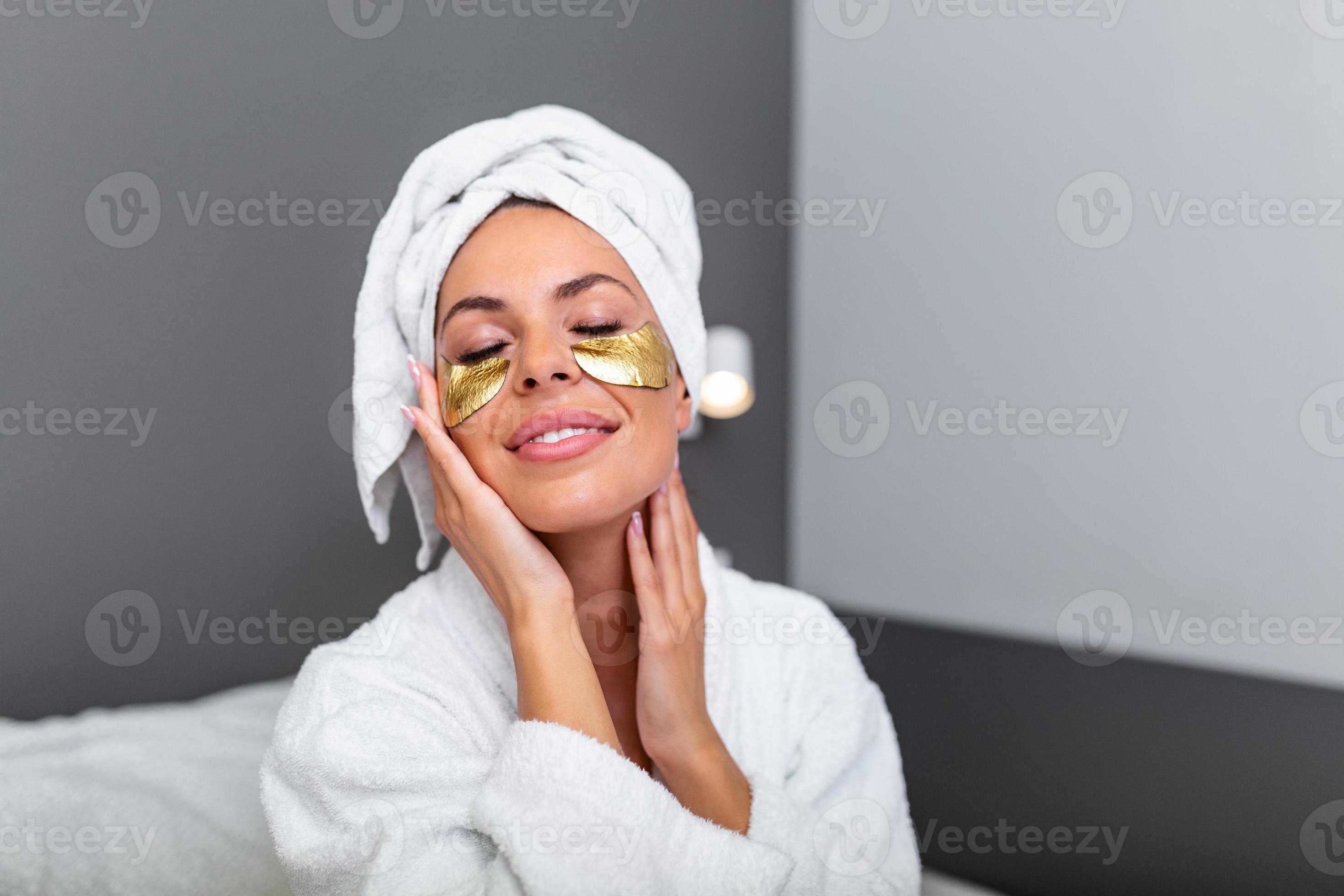 Beautiful Young Woman With Gold Cosmetics Mask Eye Patches Sitting On