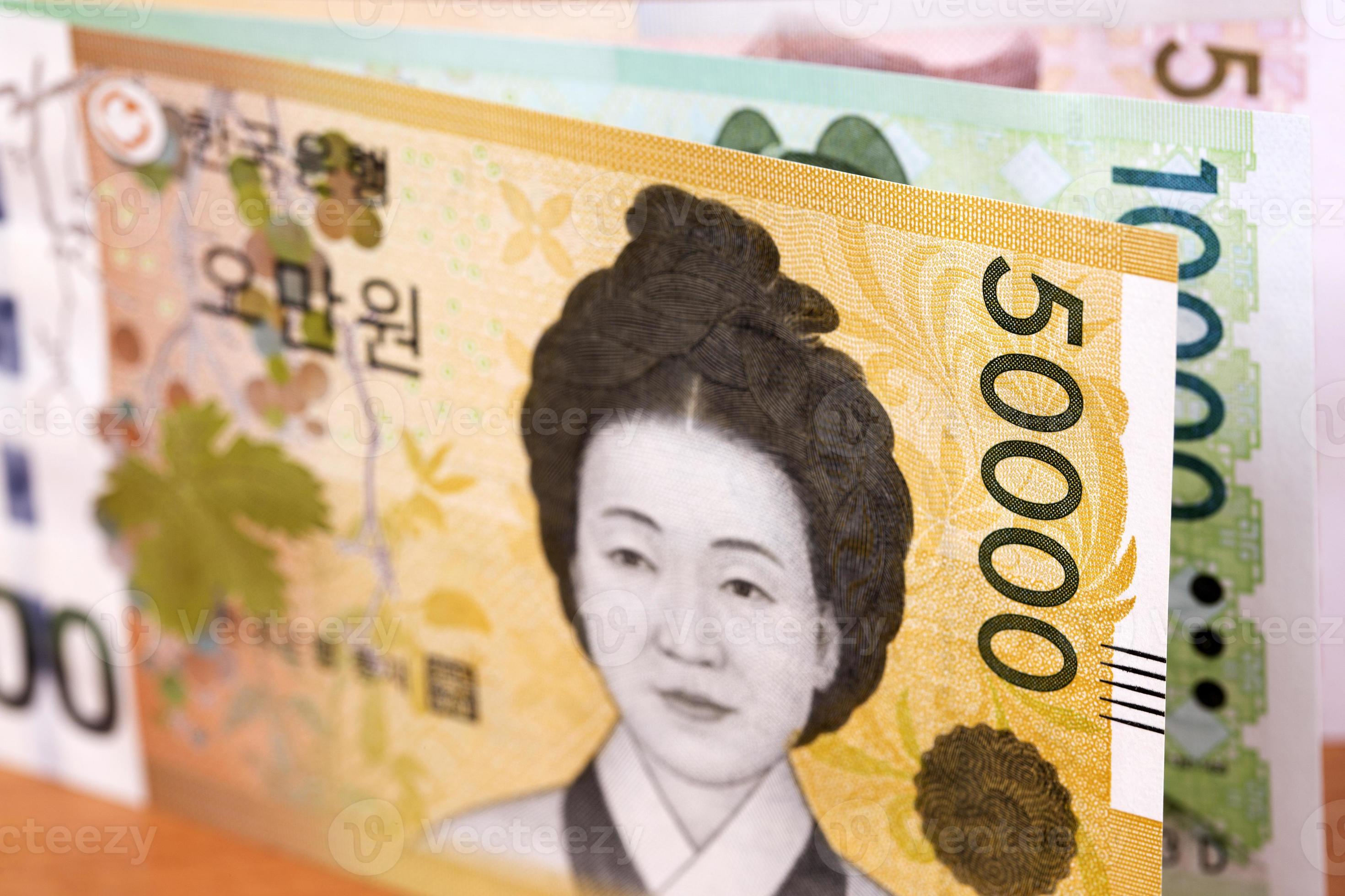 South Korean won a business background 21024099 Stock Photo at Vecteezy