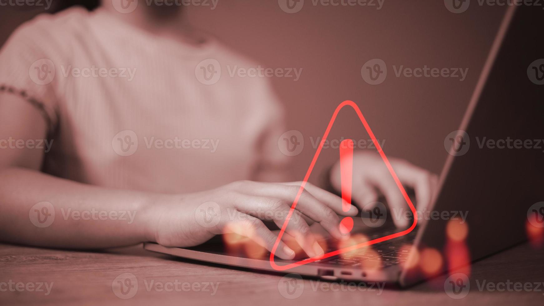 Developer Using Computer Laptop With Triangle Caution Warning Sign For