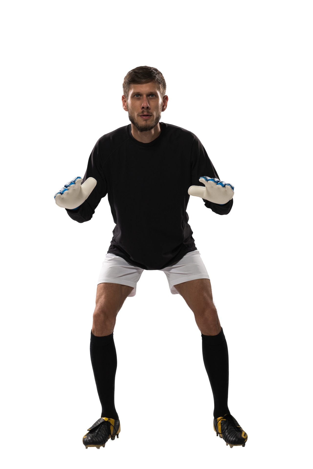 Goalkeeper Ready To Catches The Soccer Ball During A Football Match