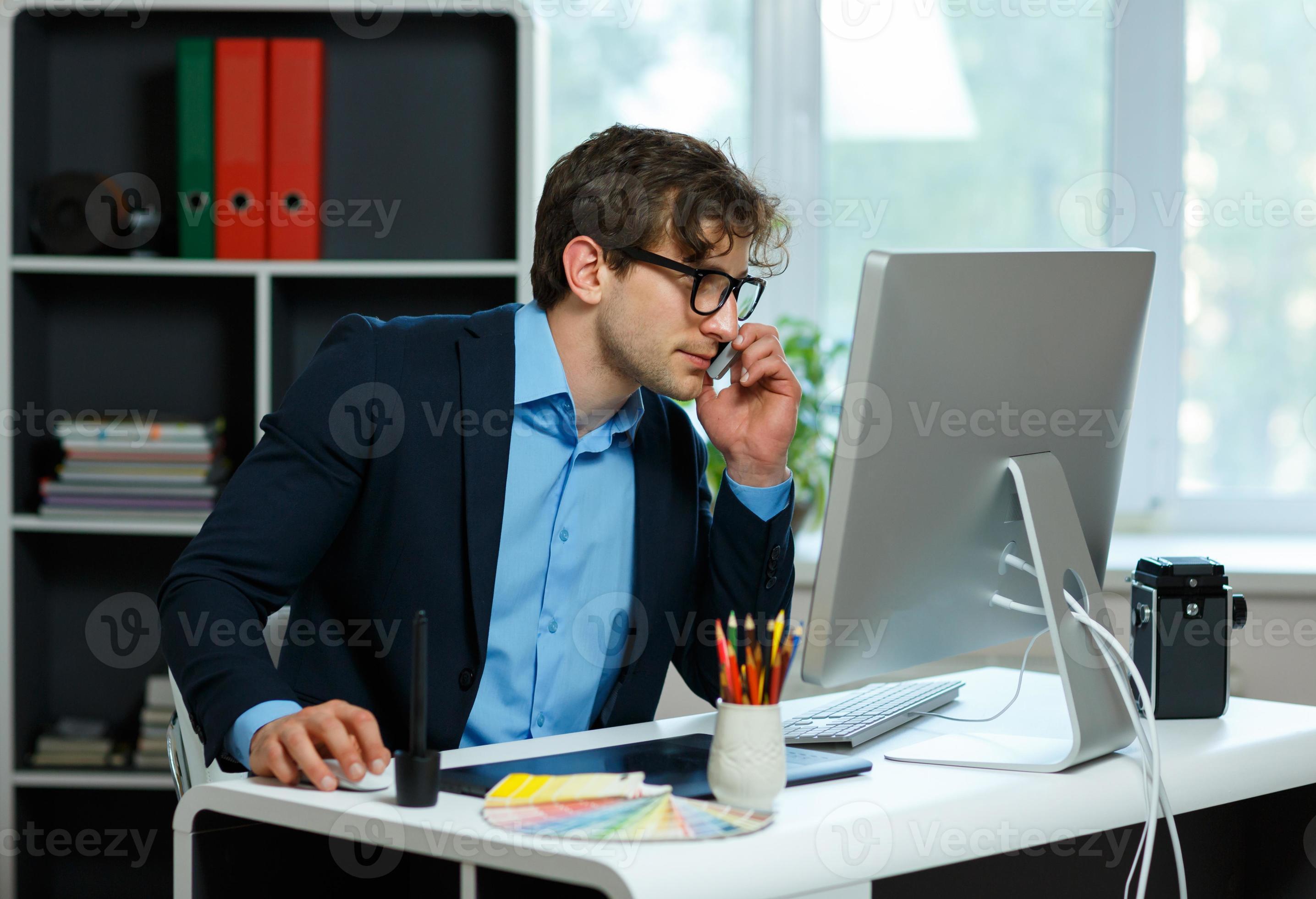 Handsome young man working from home office 21092003 Stock Photo at ... Handsome young man working from home office 21092003 Stock Photo at ...