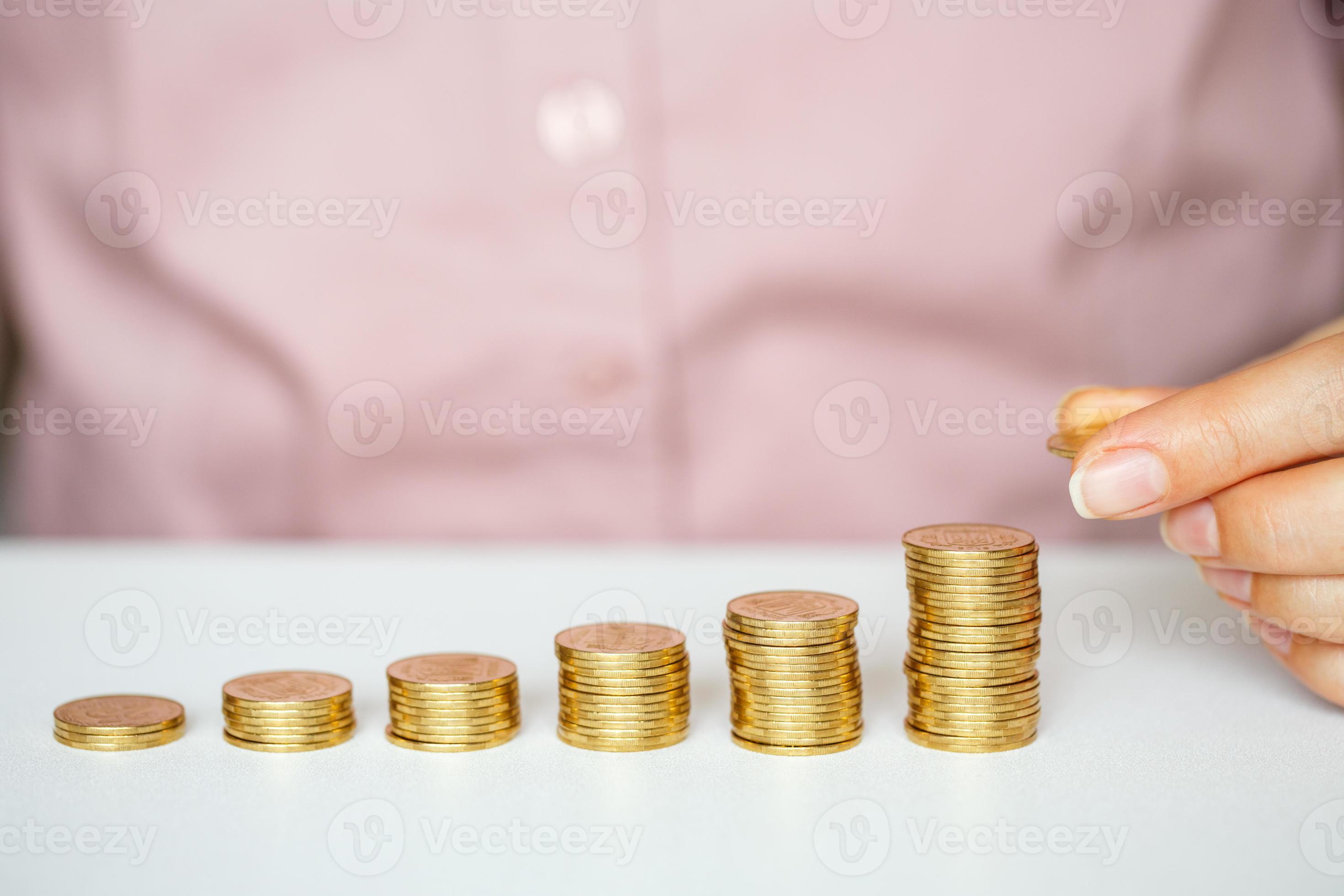 Female hand stacking gold coins into increasing columns 21093201 Stock ... Female hand stacking gold coins into increasing columns 21093201 Stock ...
