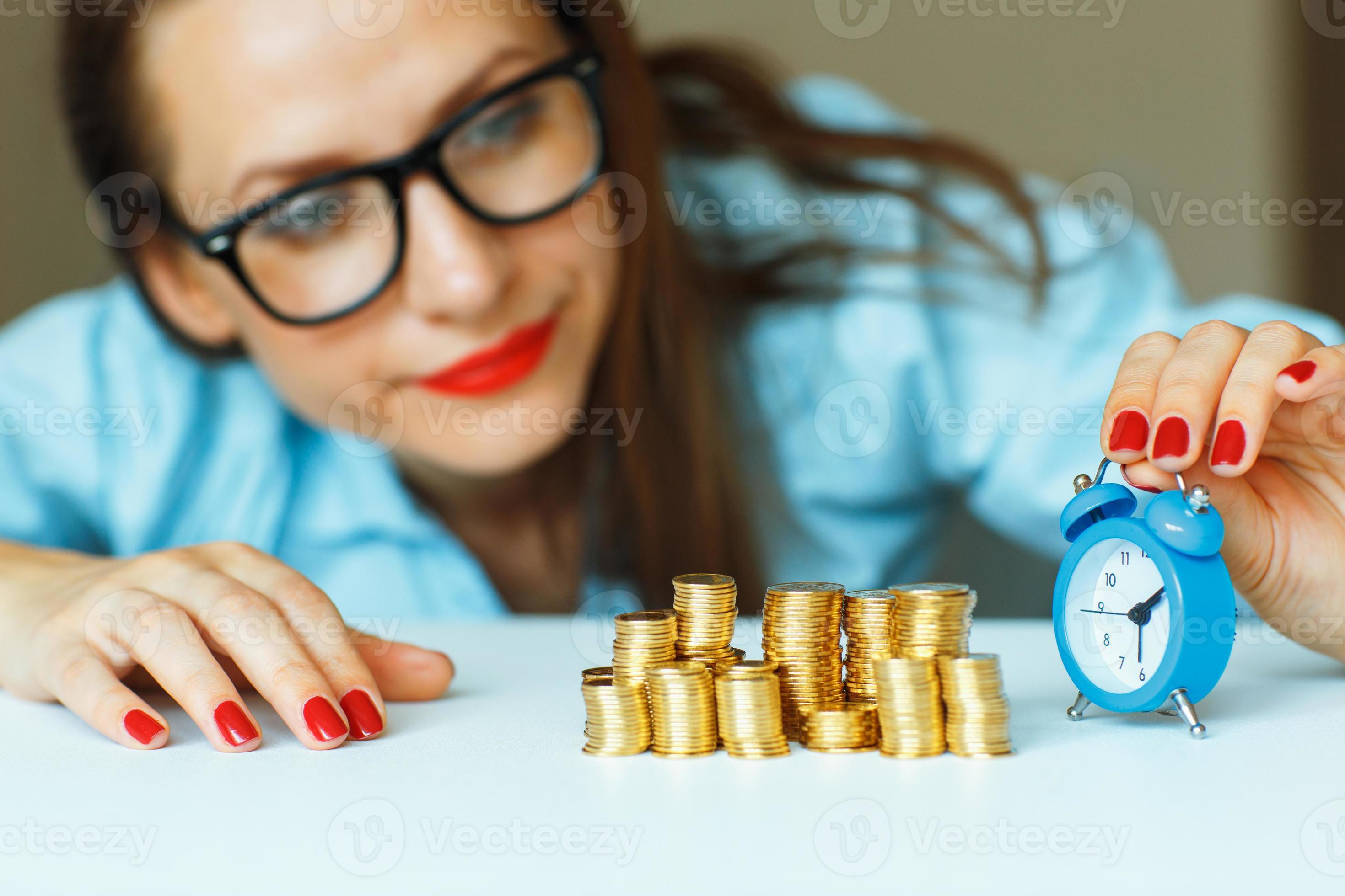Woman stacking gold coins into increasing columns 21139616 Stock Photo ... Woman stacking gold coins into increasing columns 21139616 Stock Photo ...