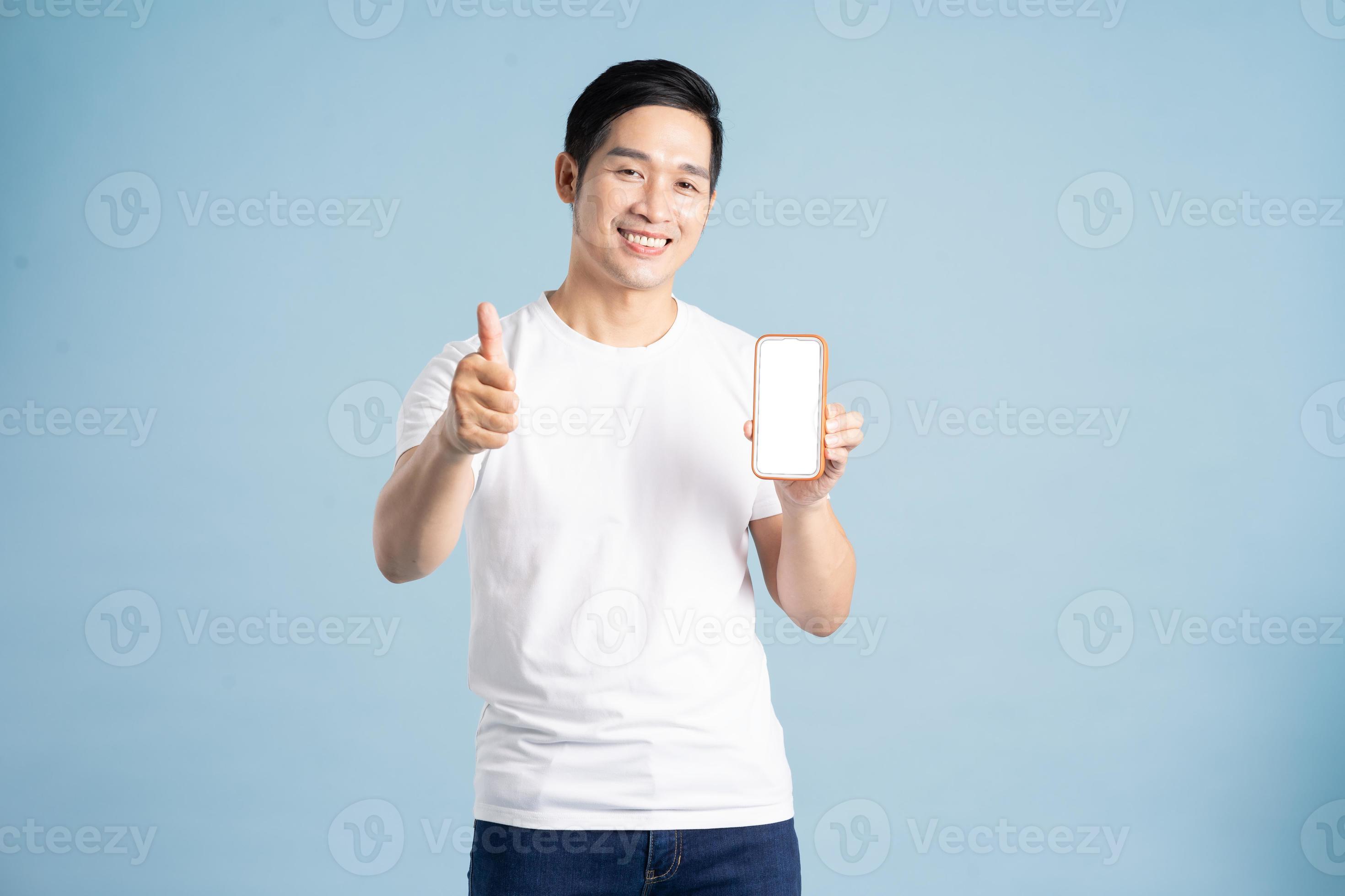 Asian male portrait posing on blue background 21511784 Stock Photo at ...