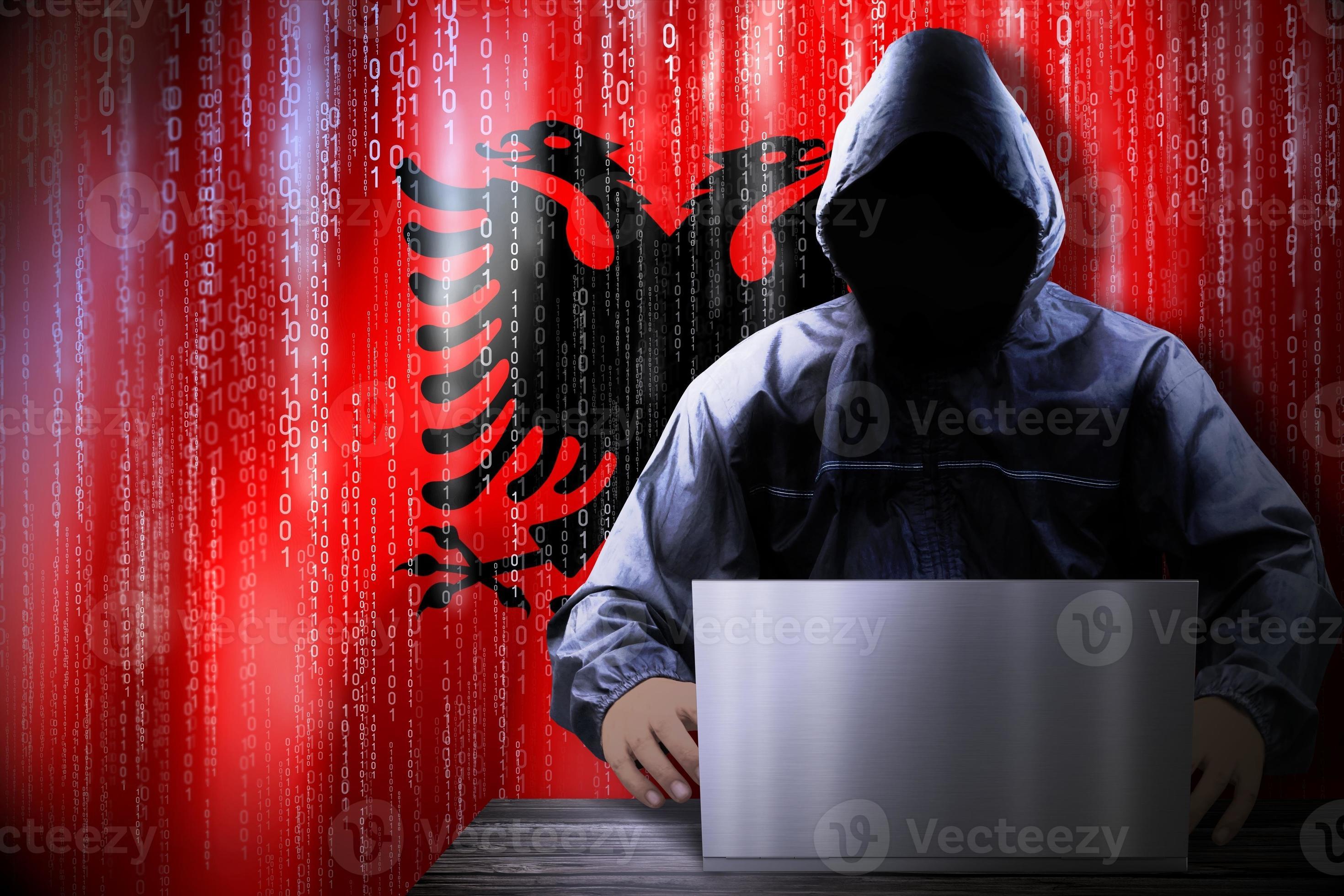 Anonymous Hooded Hacker And Flag Of Albania Binary Code Cyber Attack Concept 21572154 Stock