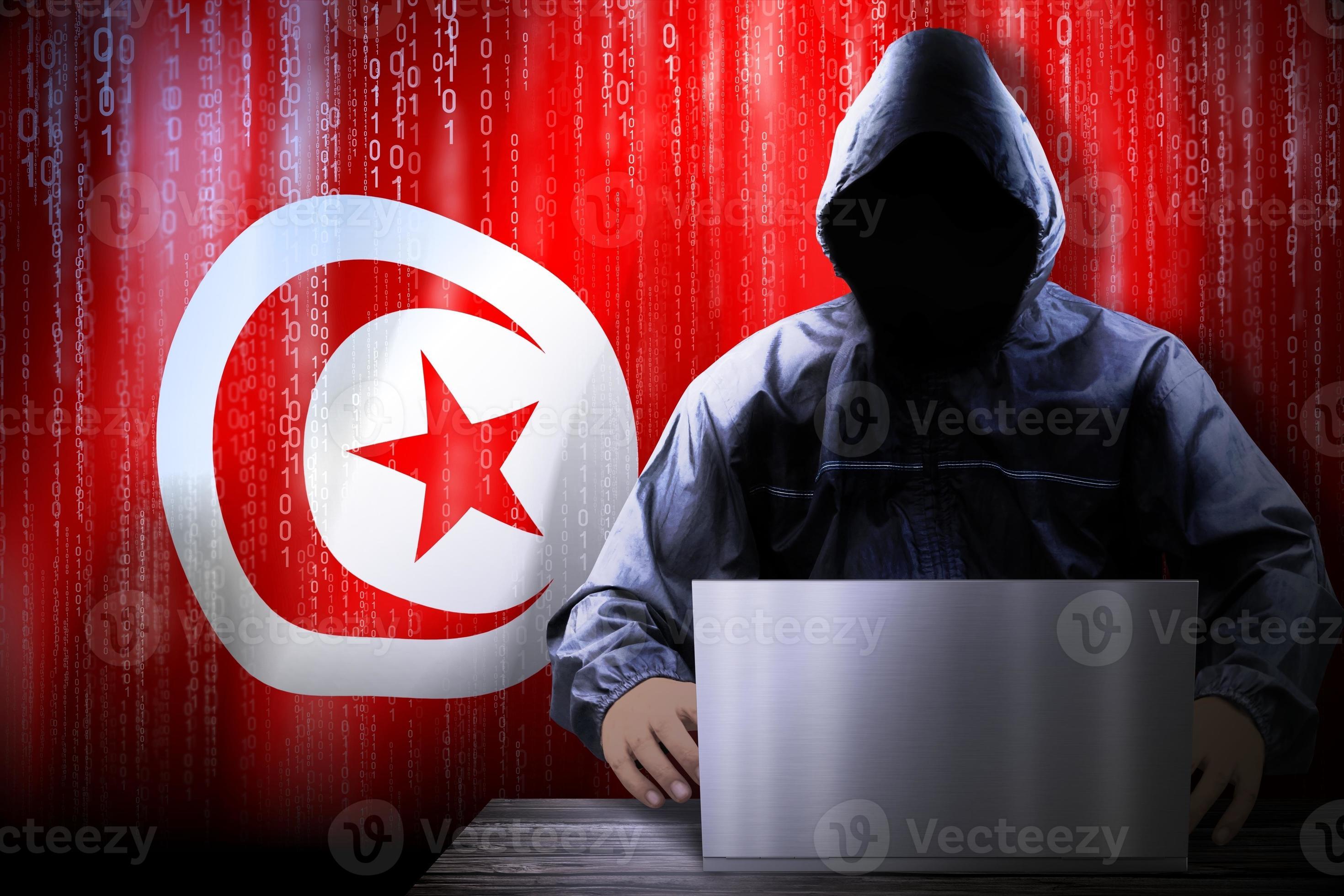 Anonymous Hooded Hacker And Flag Of Tunisia Binary Code Cyber Attack