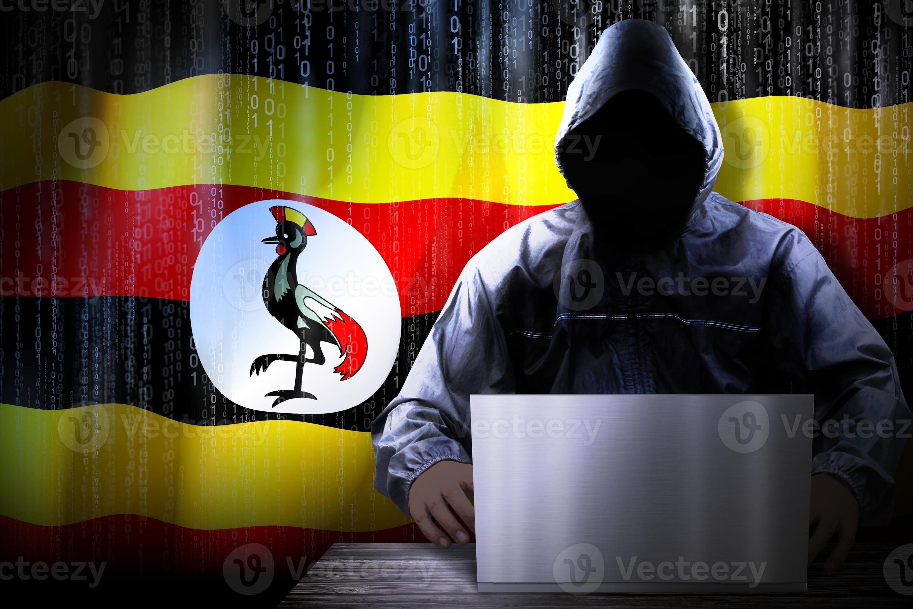 Anonymous Hooded Hacker And Flag Of Uganda Binary Code Cyber Attack