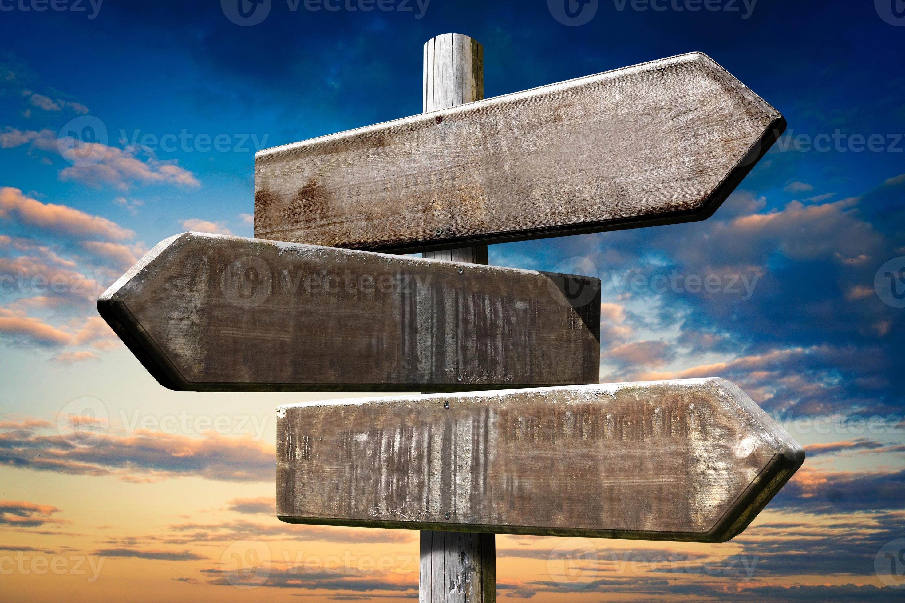 Wooden Crossroad Sign with Three Arrows 21592407 Stock Photo at Vecteezy Wooden Crossroad Sign with Three Arrows 21592407 Stock Photo at Vecteezy
