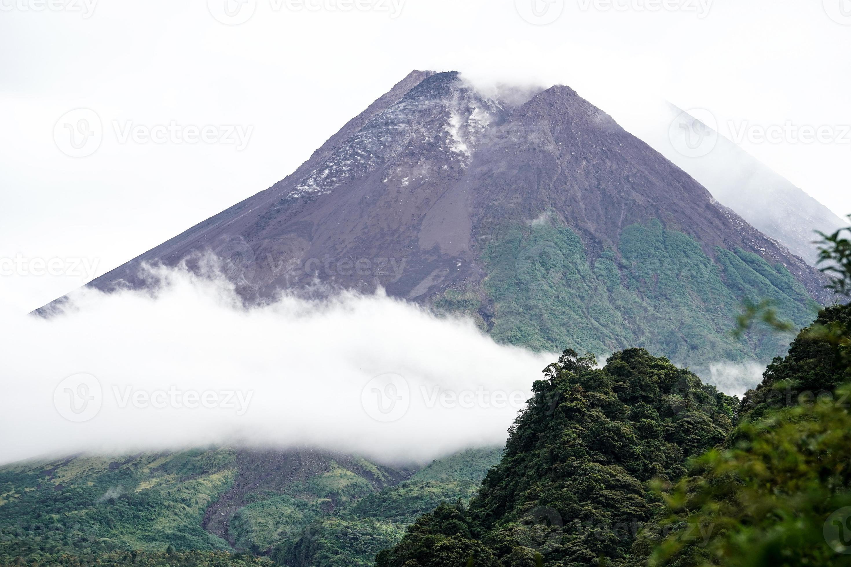 View of Mount Merapi in the morning, and slightly covered by clouds ...