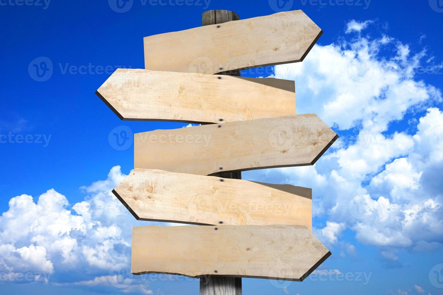 Wooden Signpost with Five Clear Arrows, Sky with Clouds in Background ... Wooden Signpost with Five Clear Arrows, Sky with Clouds in Background ...
