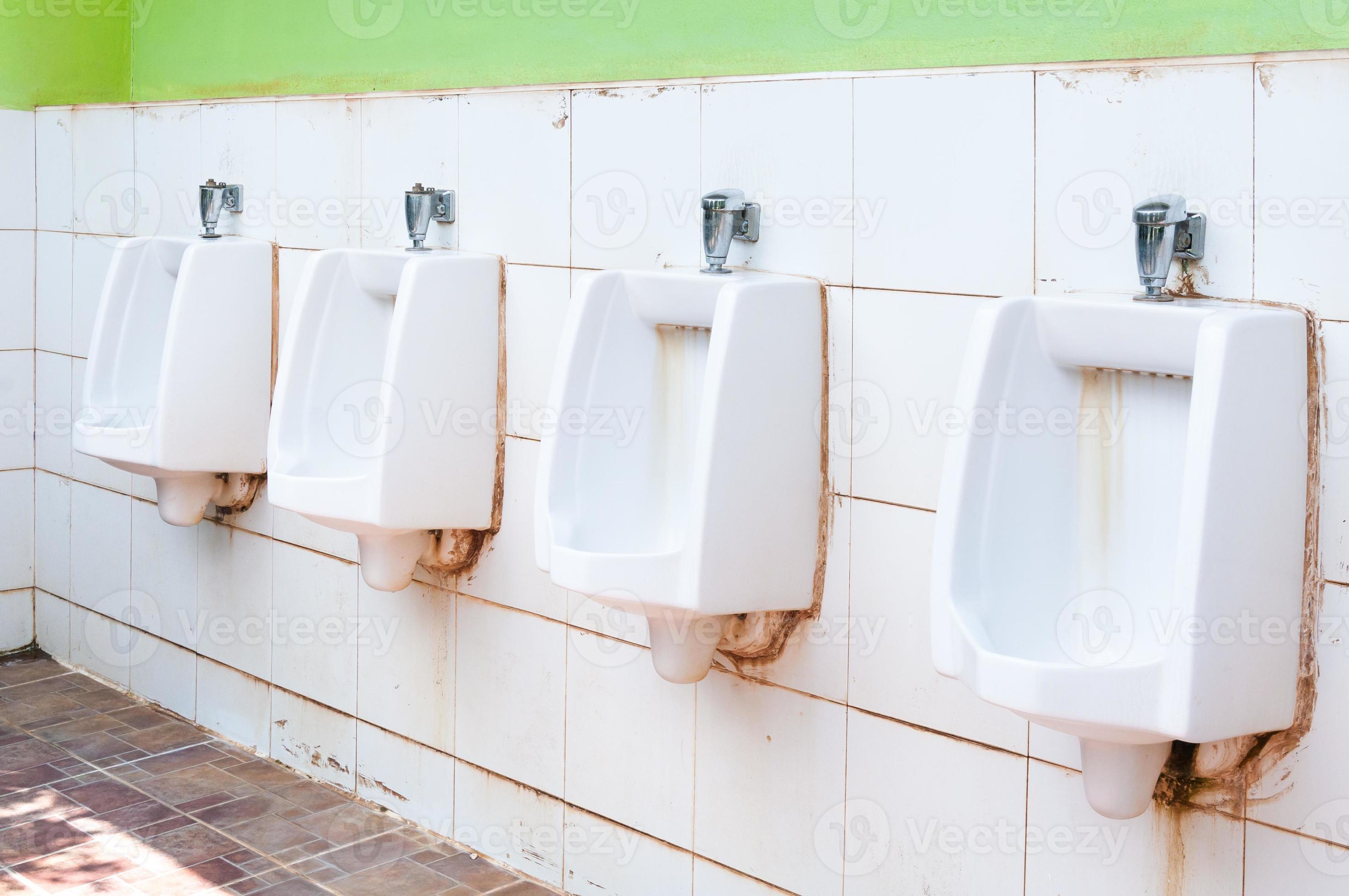 line of white porcelain urinals in public toilets, dirty toilets outdoor 21637310 Stock Photo at ...