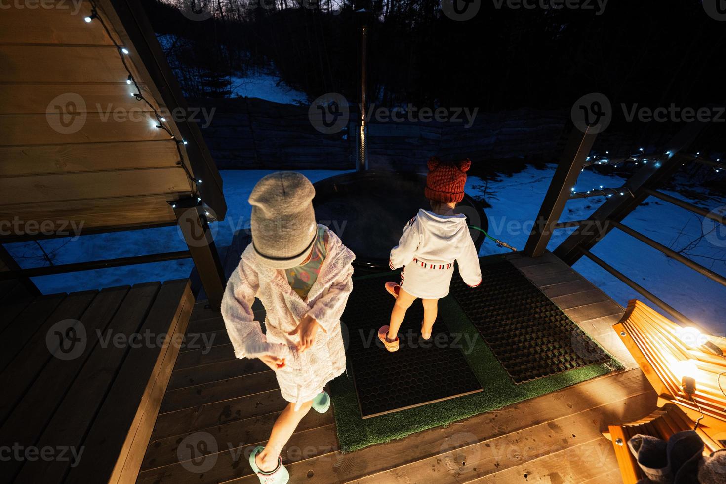 Two Sisters Preparing Bathing In Wooden Barrel Hot Tub In The Terrace Of The Cottage 3903