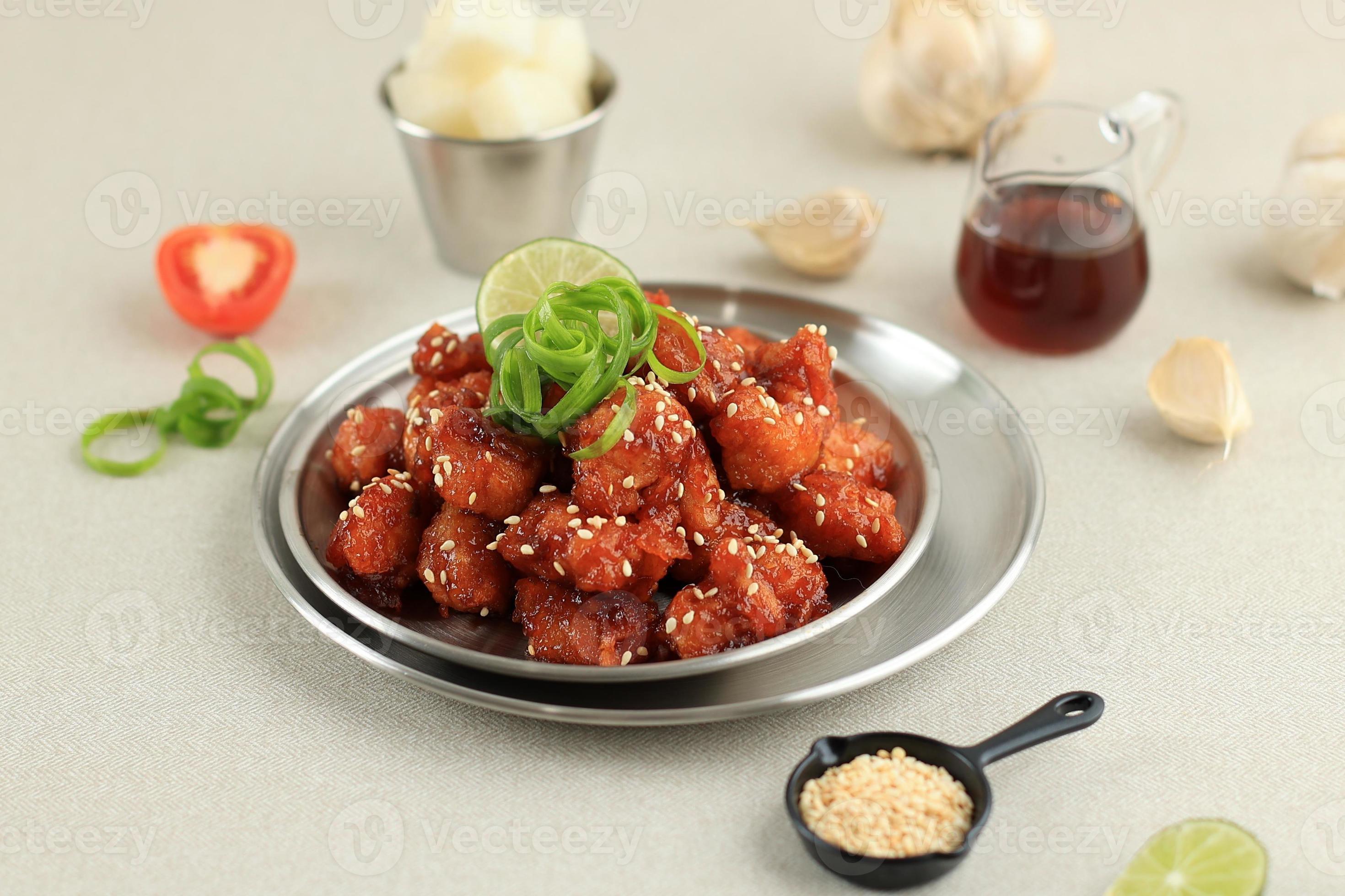 Korean Fried Chicken Yangnyeom Tongdak With Spicy Sauce And Sesame Seed