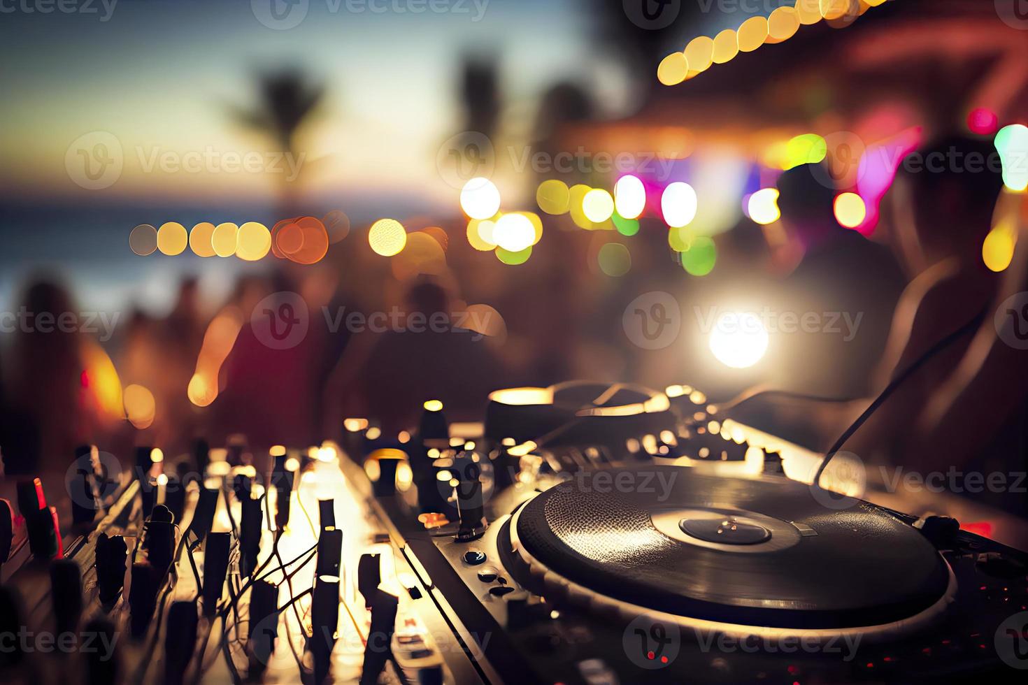 Dj mixing outdoor at beach party festival with crowd of people in background - Summer nightlife ...