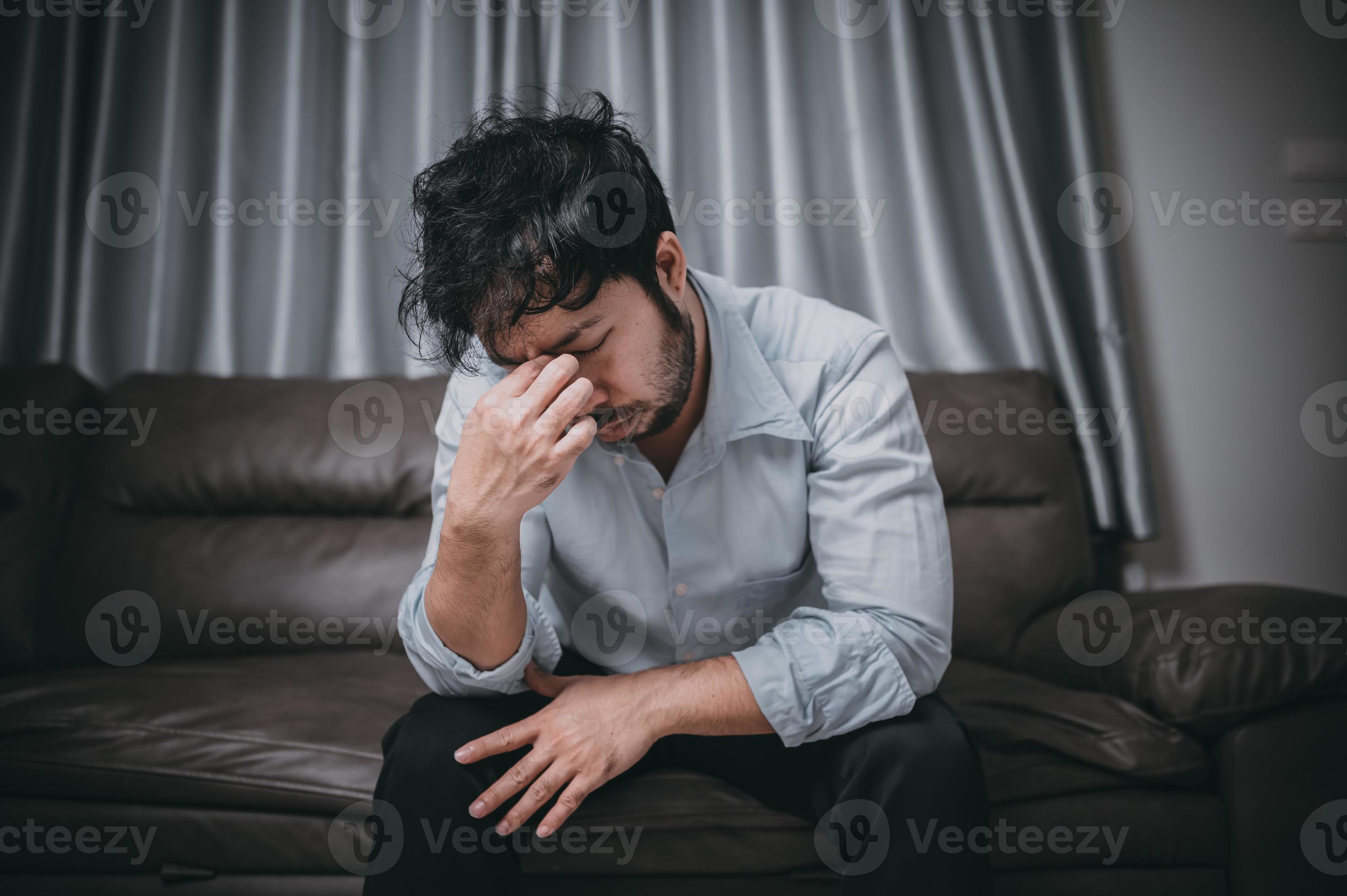 Asian handsome man stress from work overload,Tired male come back home after a lot of work from ...