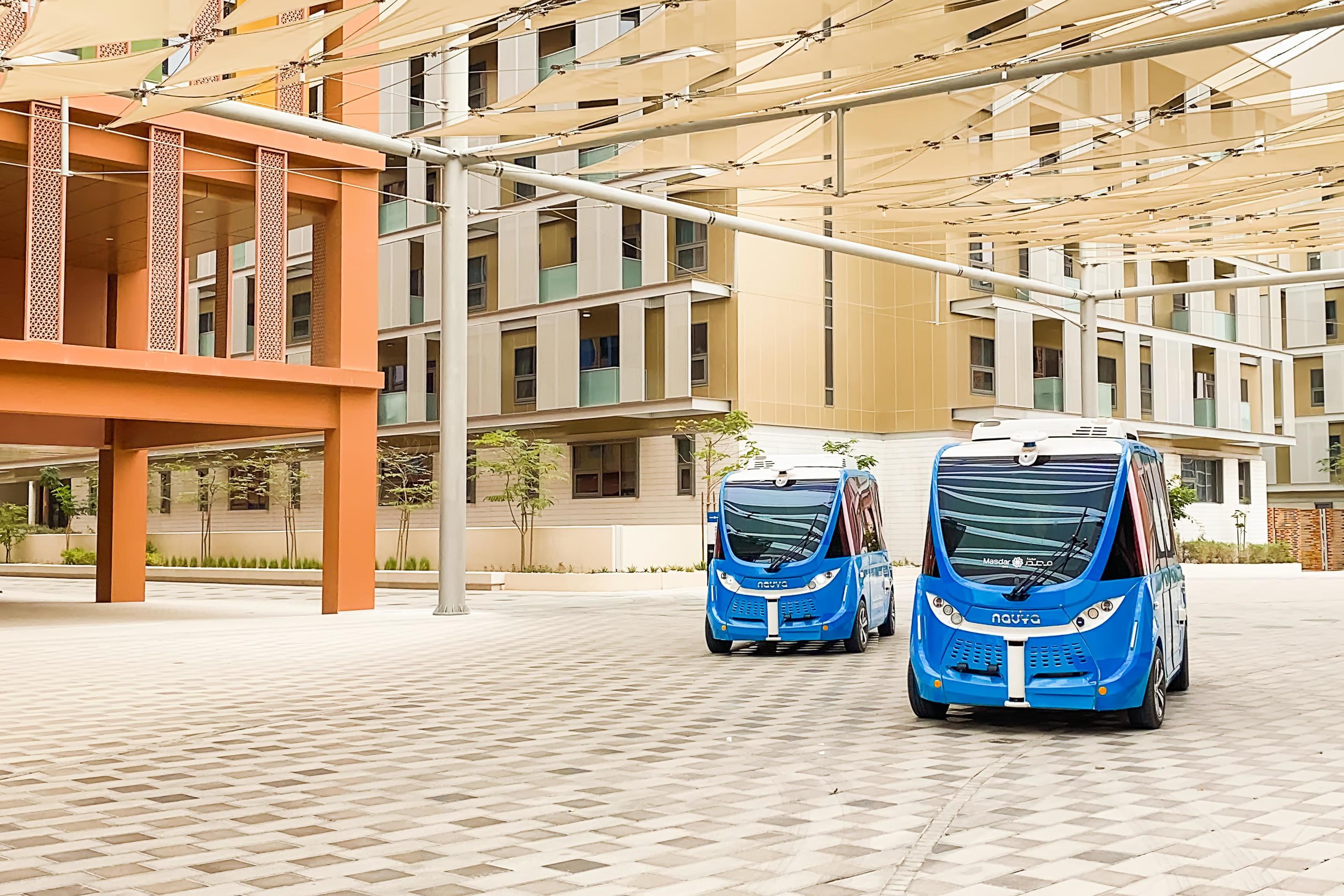UAE, Abu Dhabi, 2023 - Autonomous car stand in futuristic city Masdar ... UAE, Abu Dhabi, 2023 - Autonomous car stand in futuristic city Masdar ...