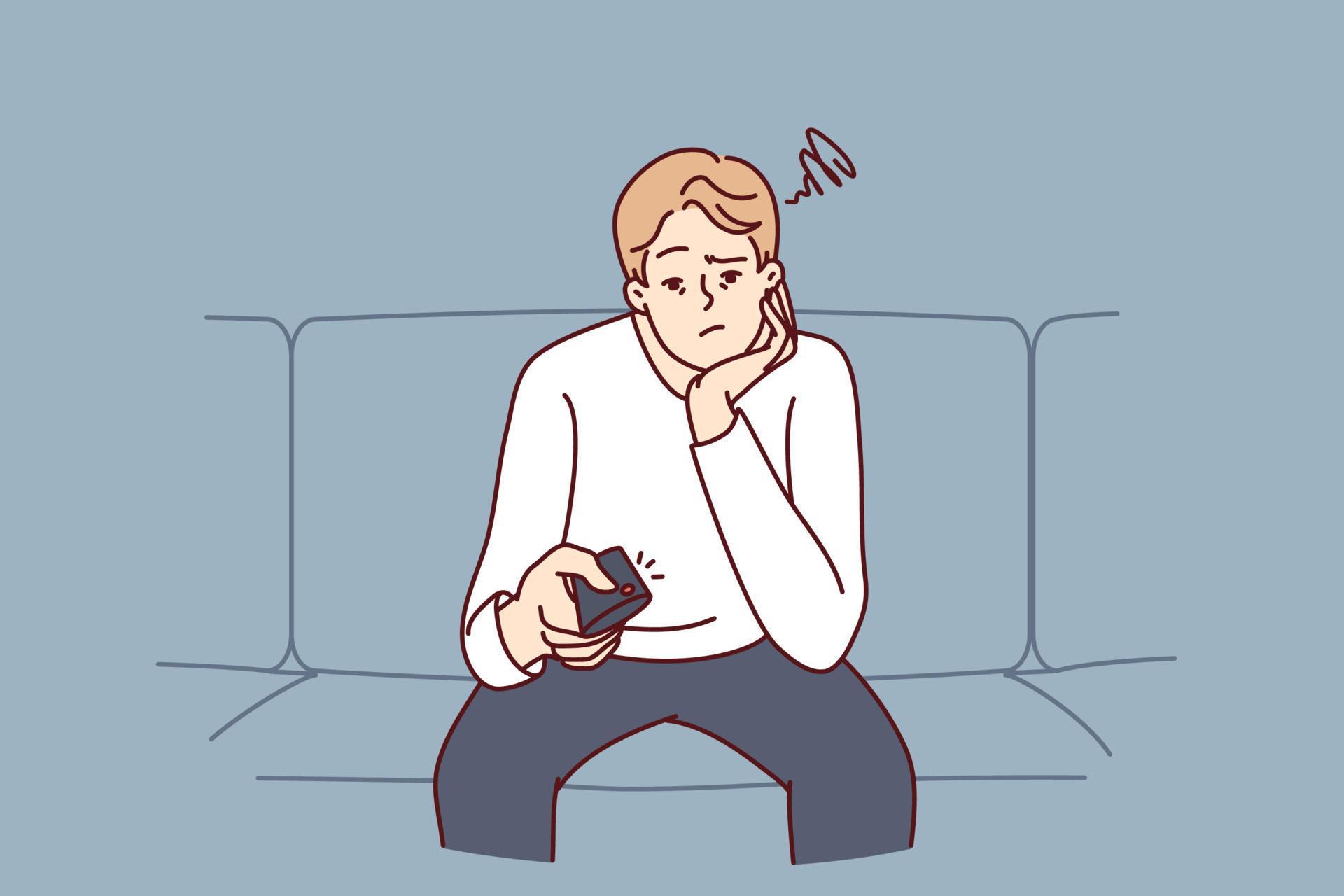 Bored man holding TV remote due to lack of satellite TV channels with ... Bored man holding TV remote due to lack of satellite TV channels with ...