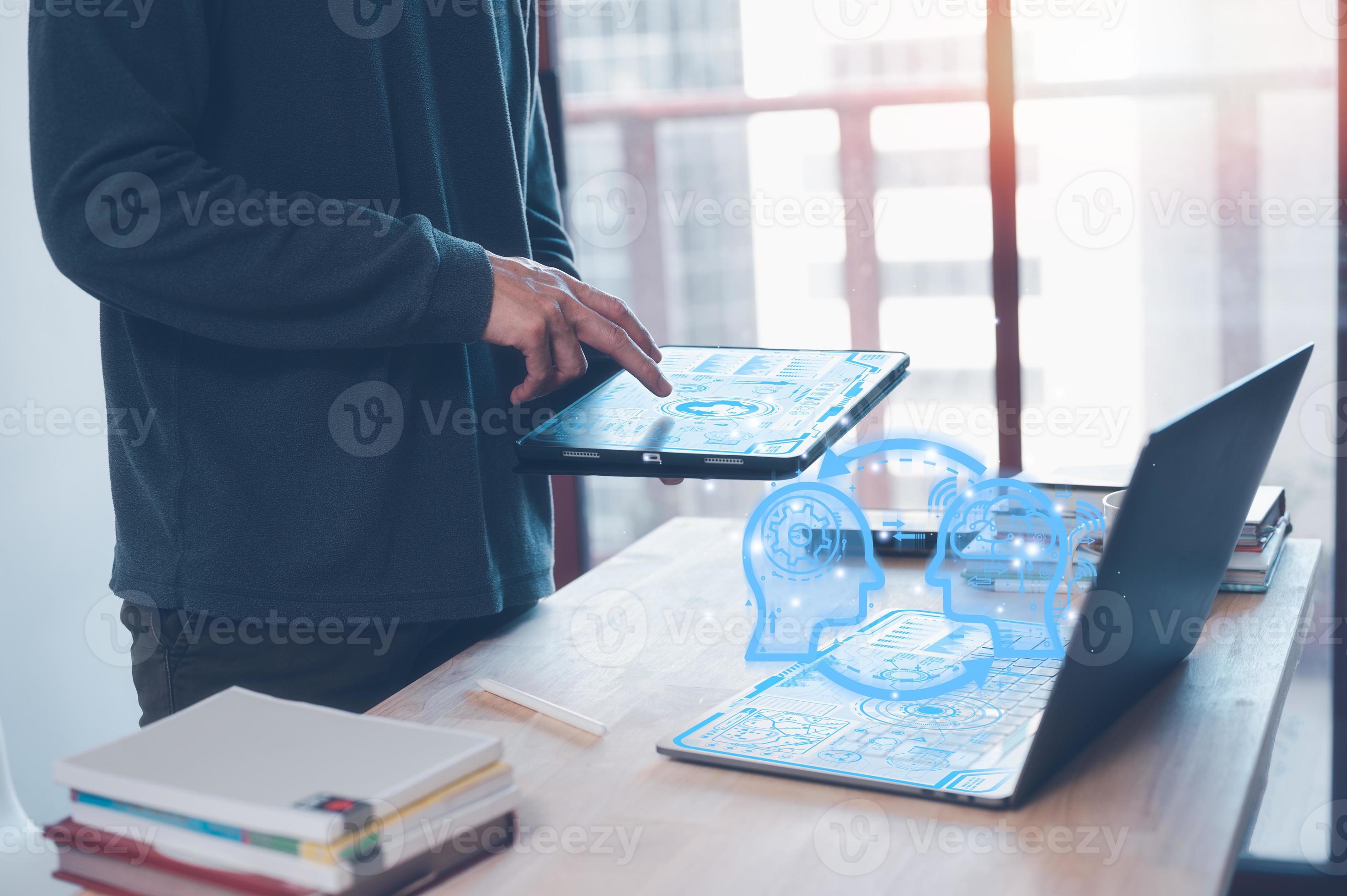 AI technology concept, man using tablet and computer laptop working ...