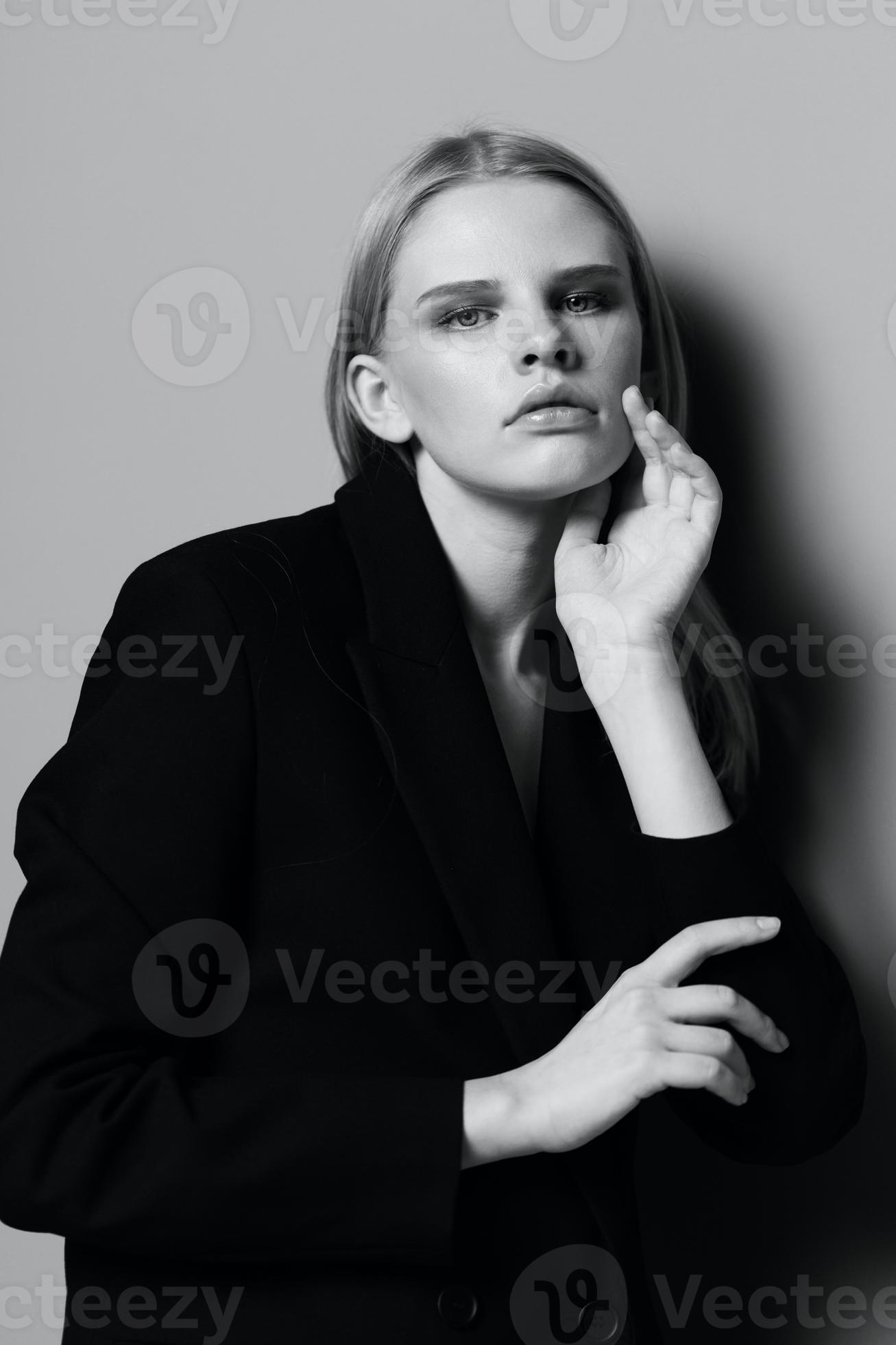 Elegant Girl Puts Her Hand To Her Face Tucks Her Hair Behind Her Ear