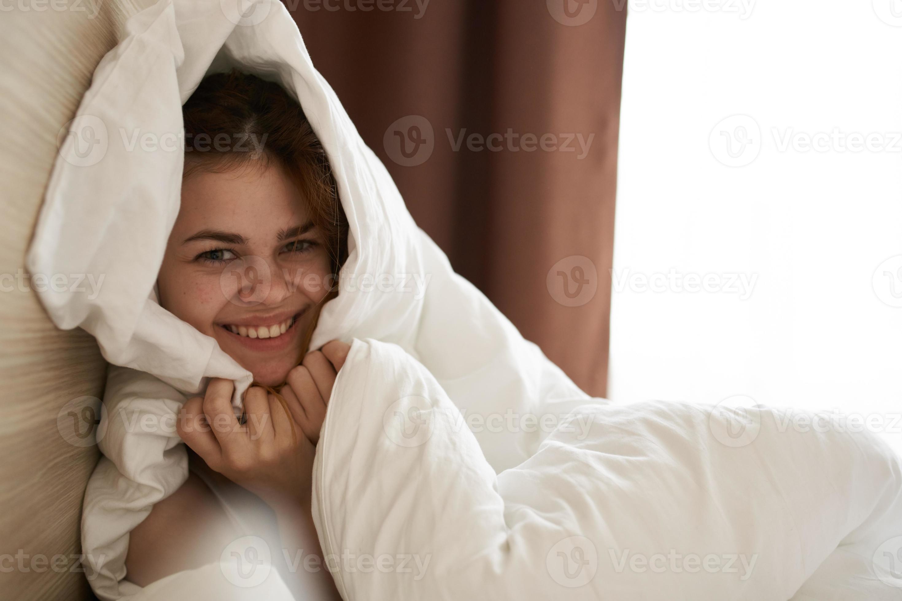 Cute Woman Tied Up Under Blanket In Bed In The Morning Near Window Cropped View 22058391 Stock