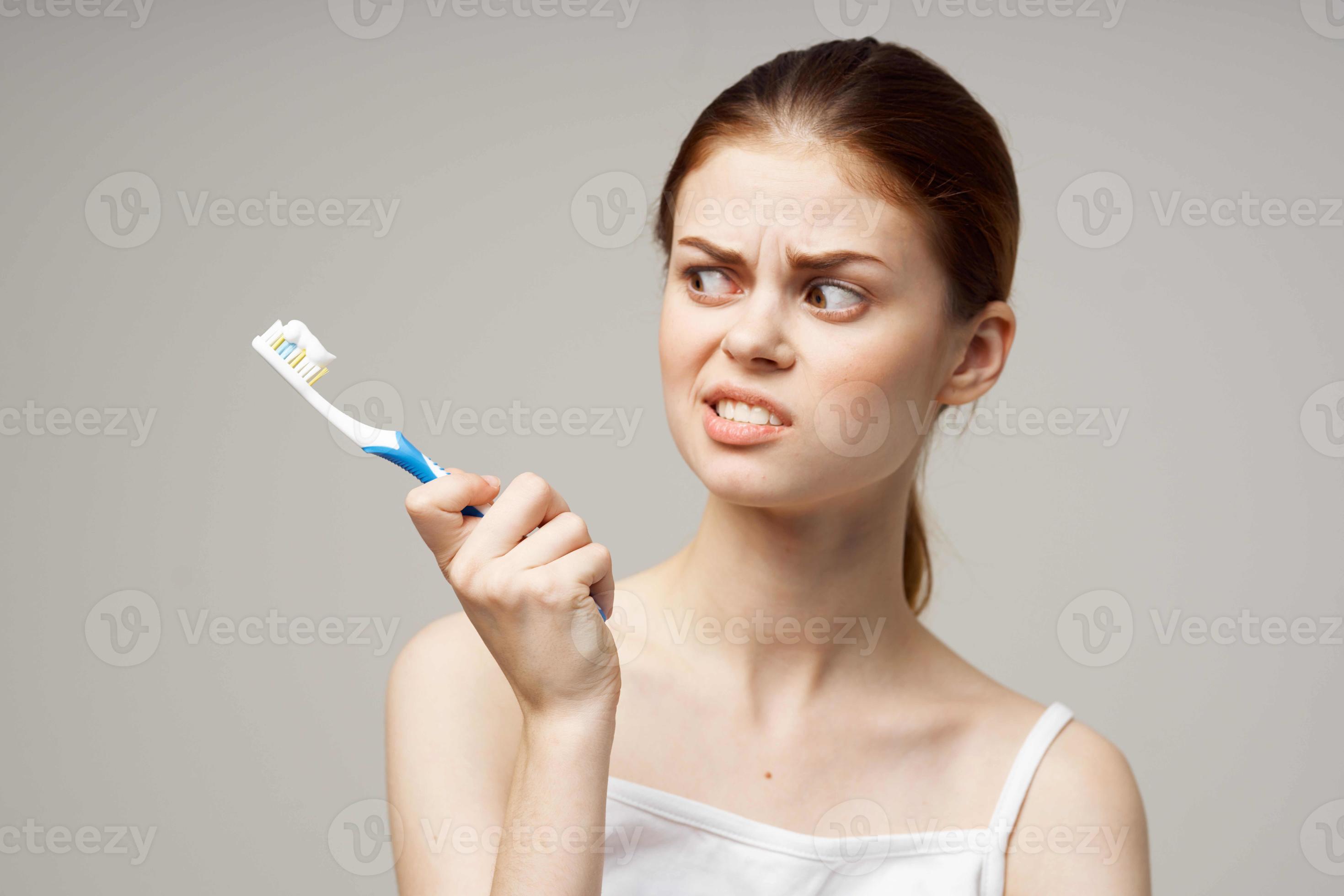 Cheerful Woman Toothpaste Brushing Teeth Dental Health Light Background