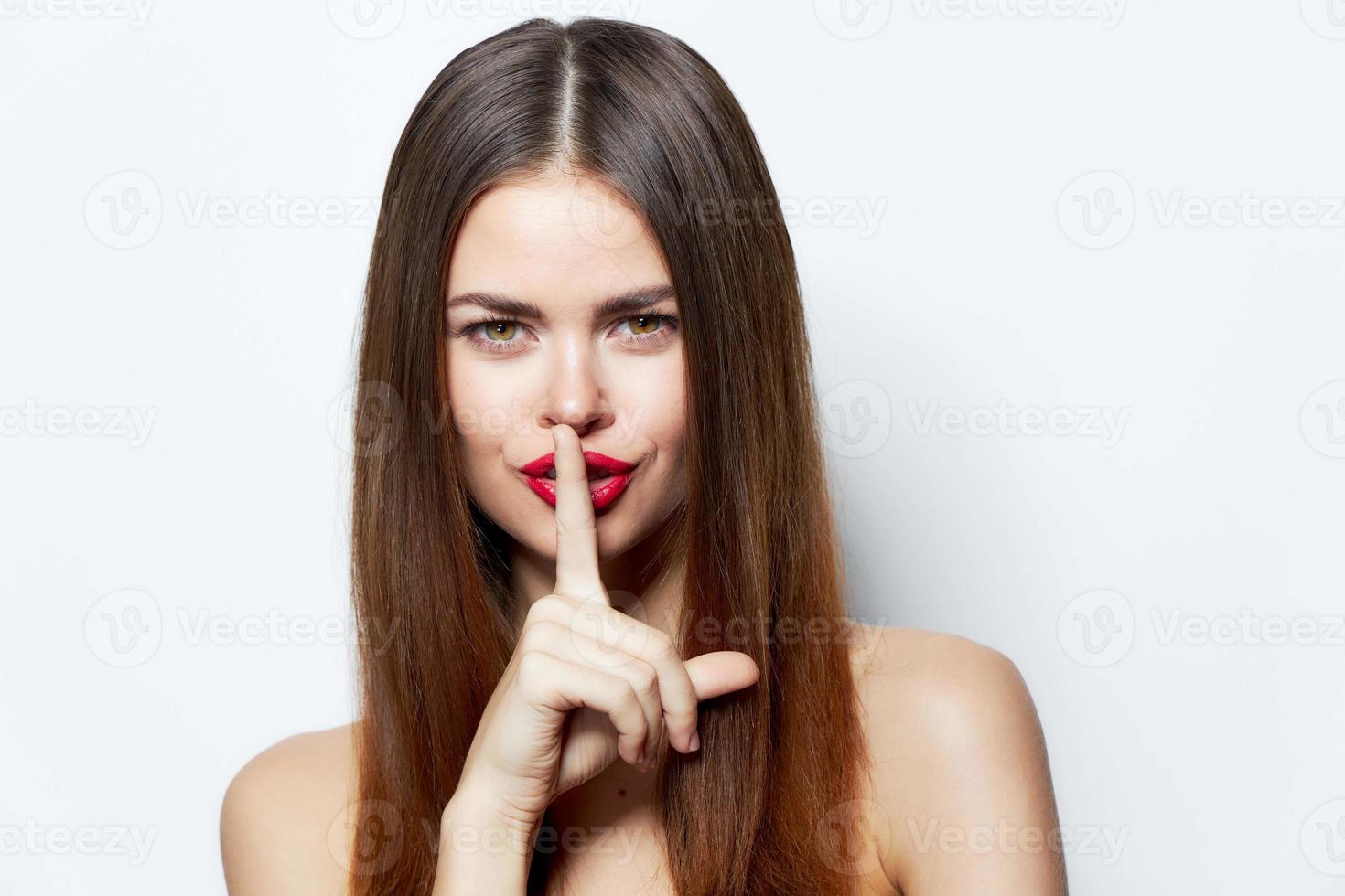Sexy Woman Holds His Finger Near His Lips And Classified Information