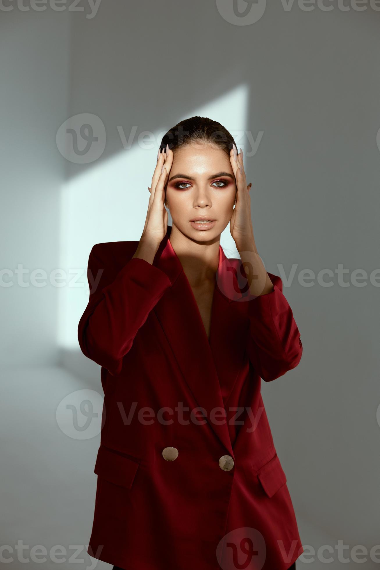 Attractive Woman Holding Face Red Jacket Fashion Studio 22260766 Stock attractive-woman-holding-face-red-jacket-fashion-studio-22260766-stock