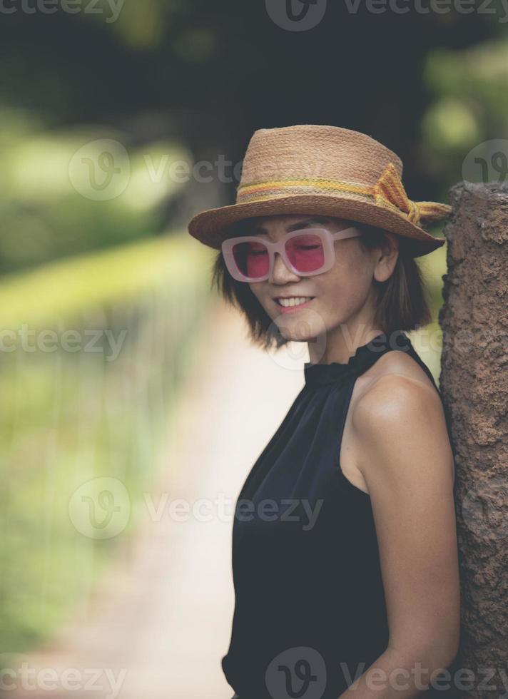 beautiful asian woman wearing straw hat toothy smiling with happiness ... beautiful asian woman wearing straw hat toothy smiling with happiness ...