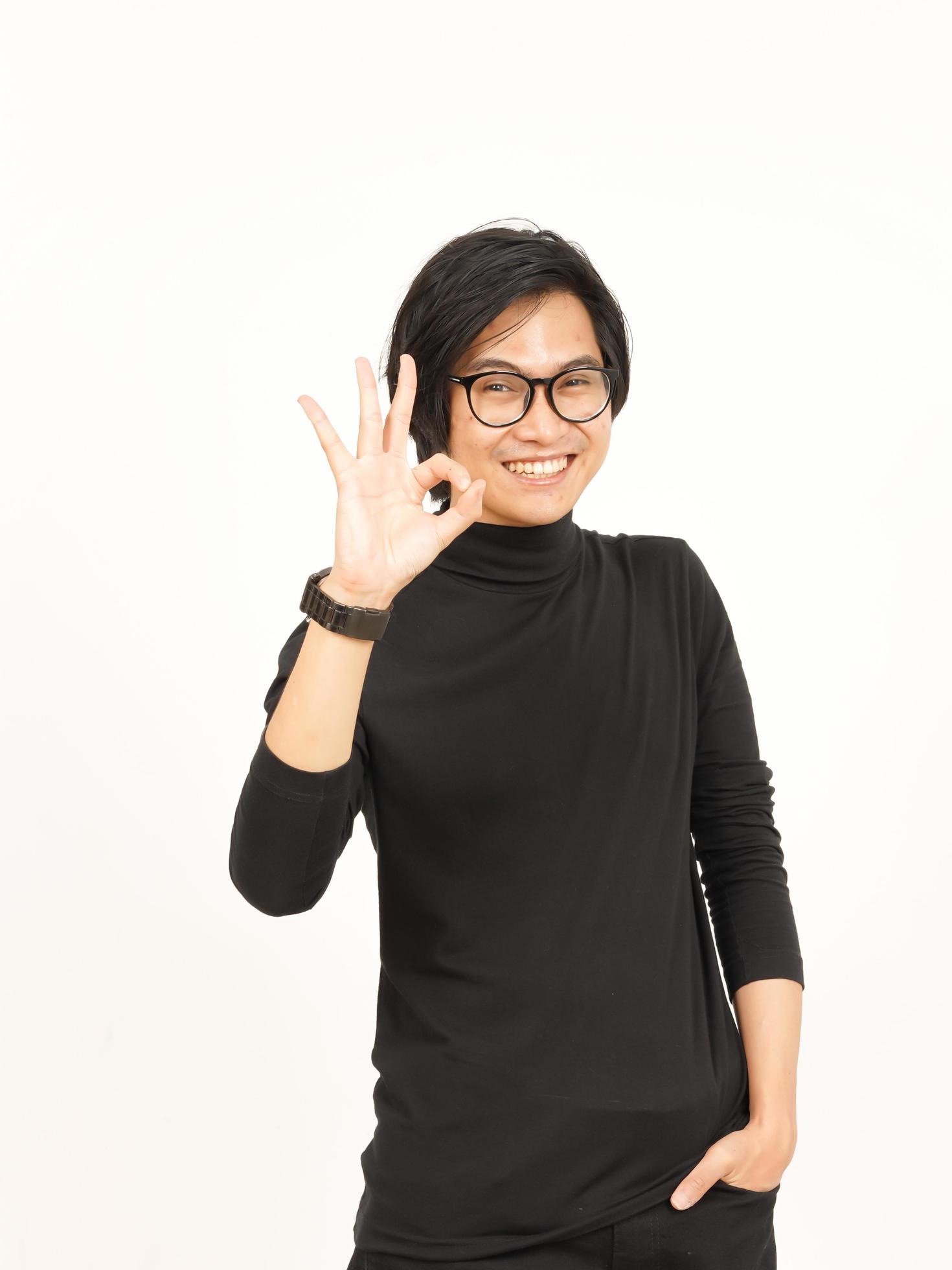 Showing Ok Sign Of Handsome Asian Man Isolated On White Background