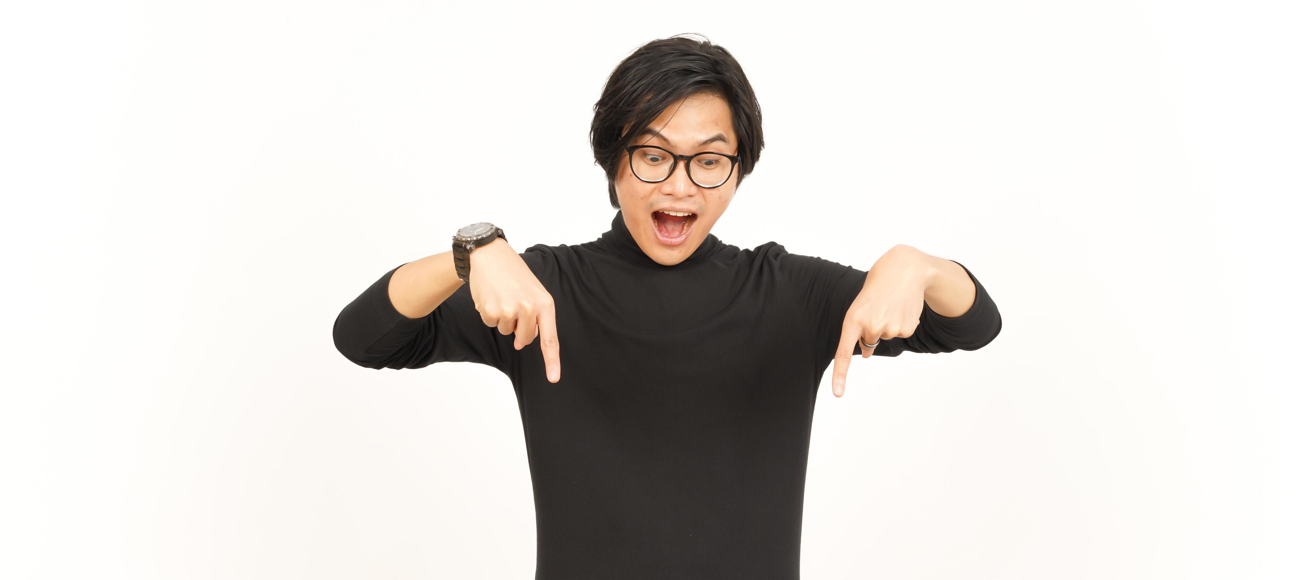 Showing Product and Pointing Down Of Beautiful Asian Man Isolated On ...