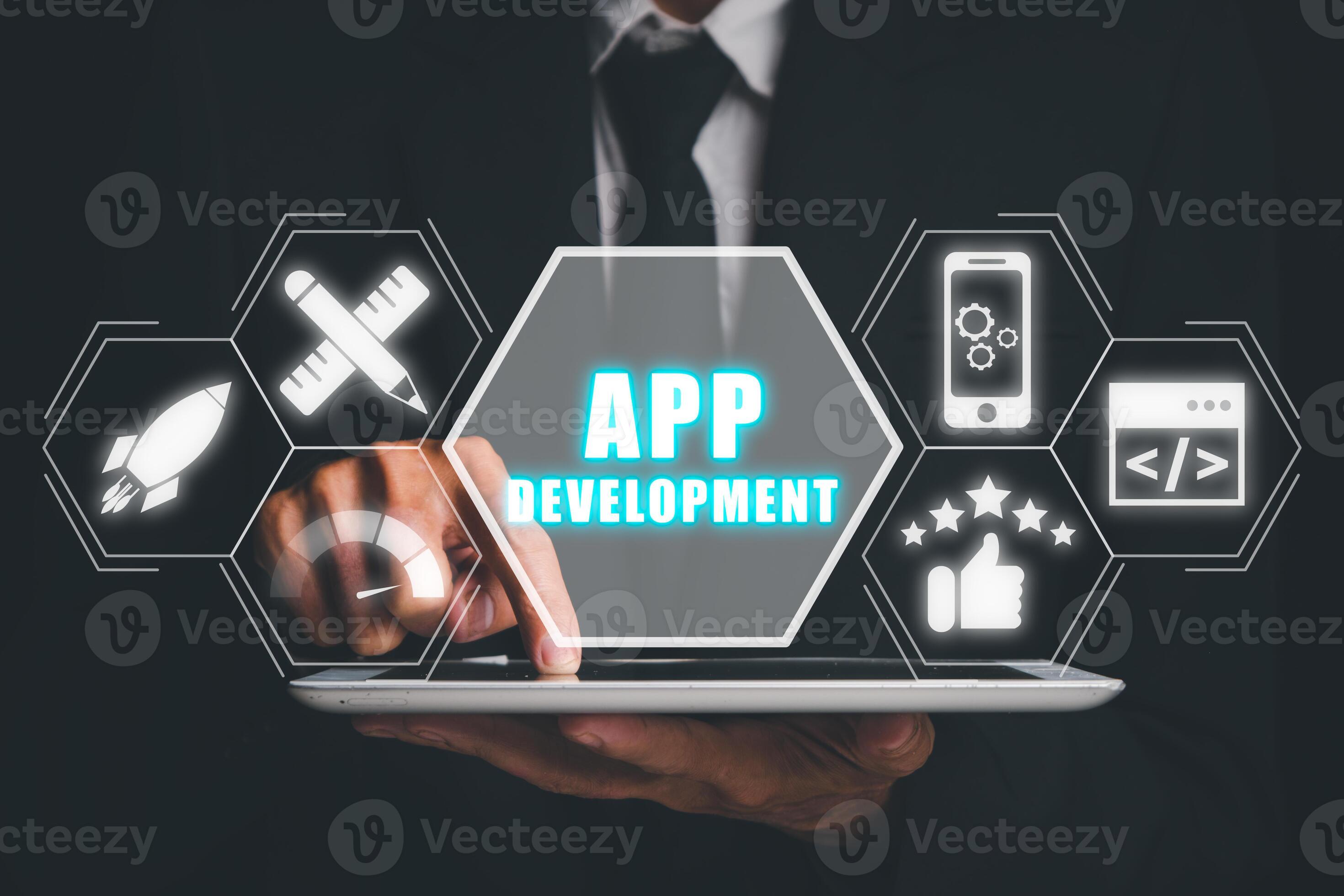 App development concept, Person hand using tablet with app development ...