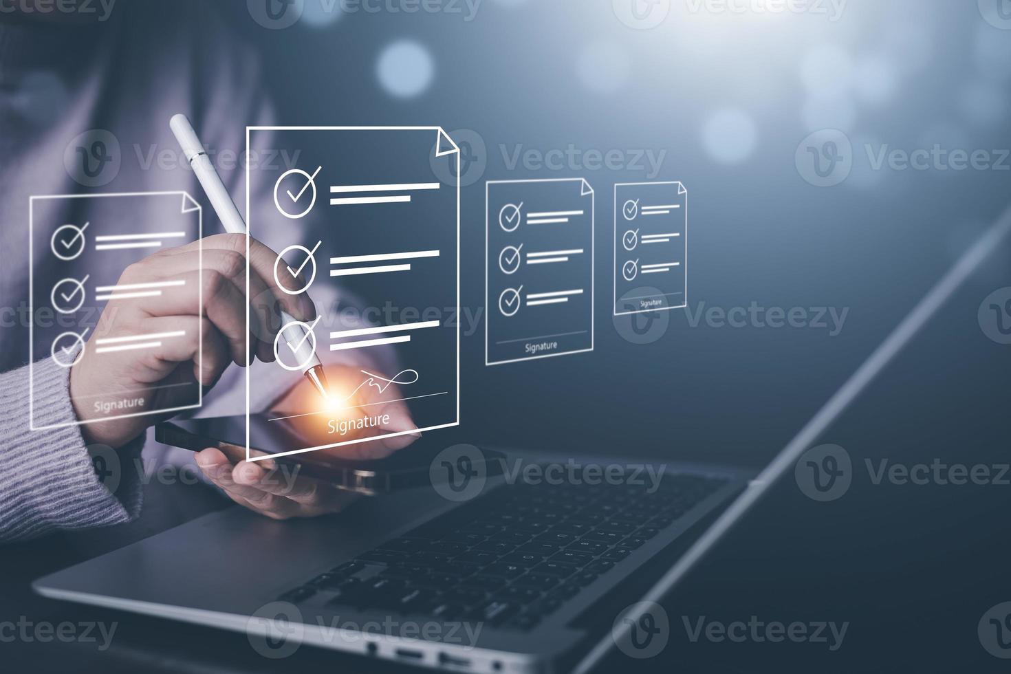 Signing electronic documents on digital documents Online and checklist and clipboard task ...