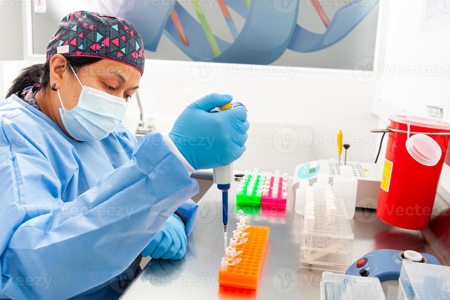 Female Scientist Extracting Dna Using The Spin Column Based Nucleic